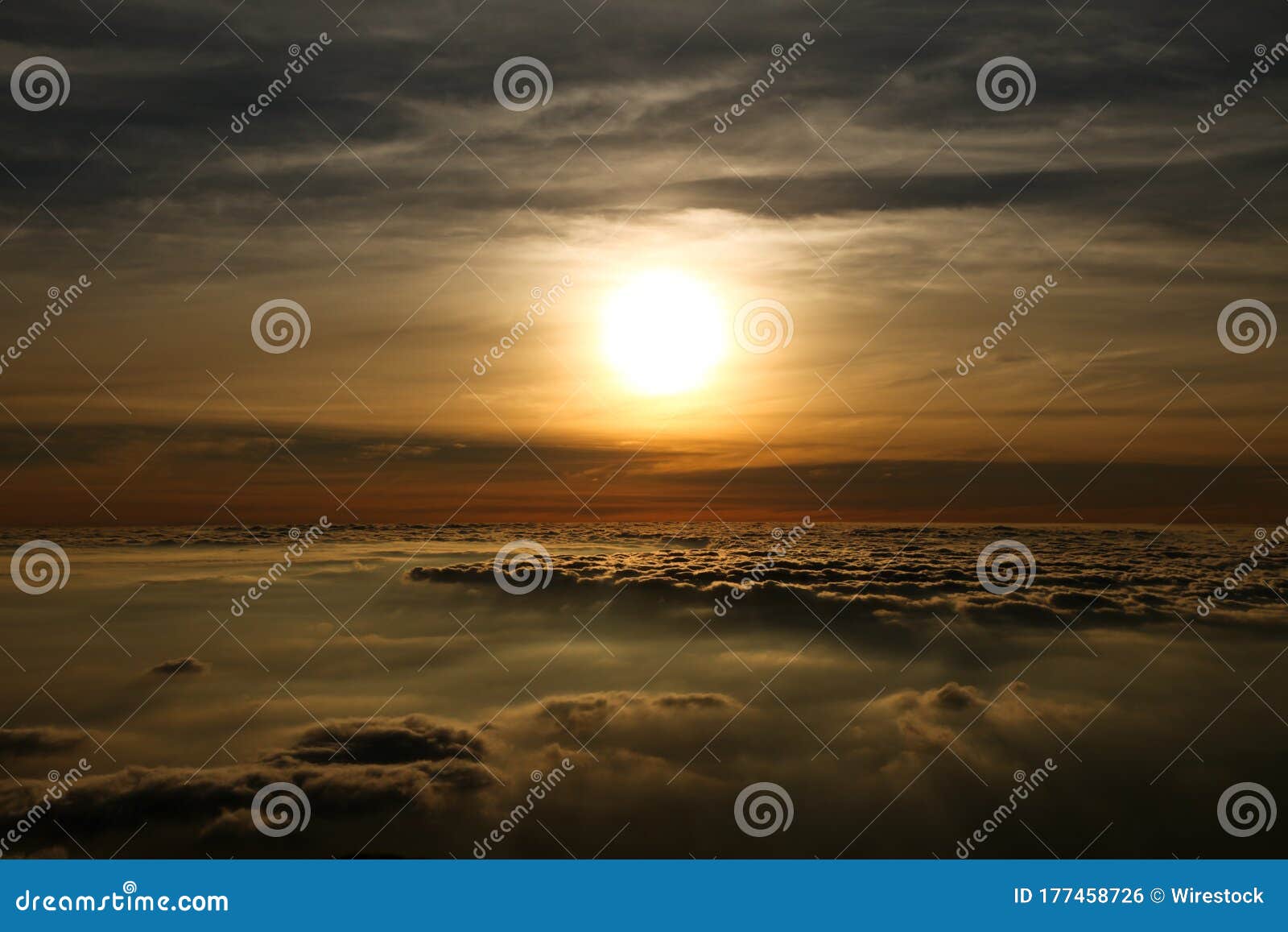 Beautiful Rising Sun Glowing Over the Clouds Stock Photo - Image of ...