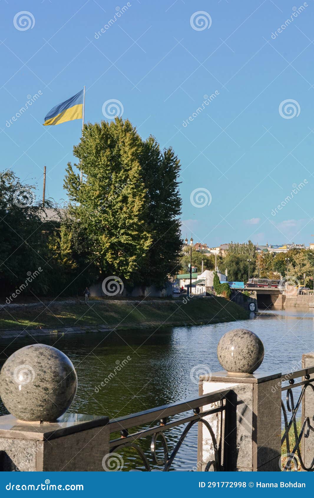 A Beautiful River in the City and a Developing Flag of Ukraine Stock ...