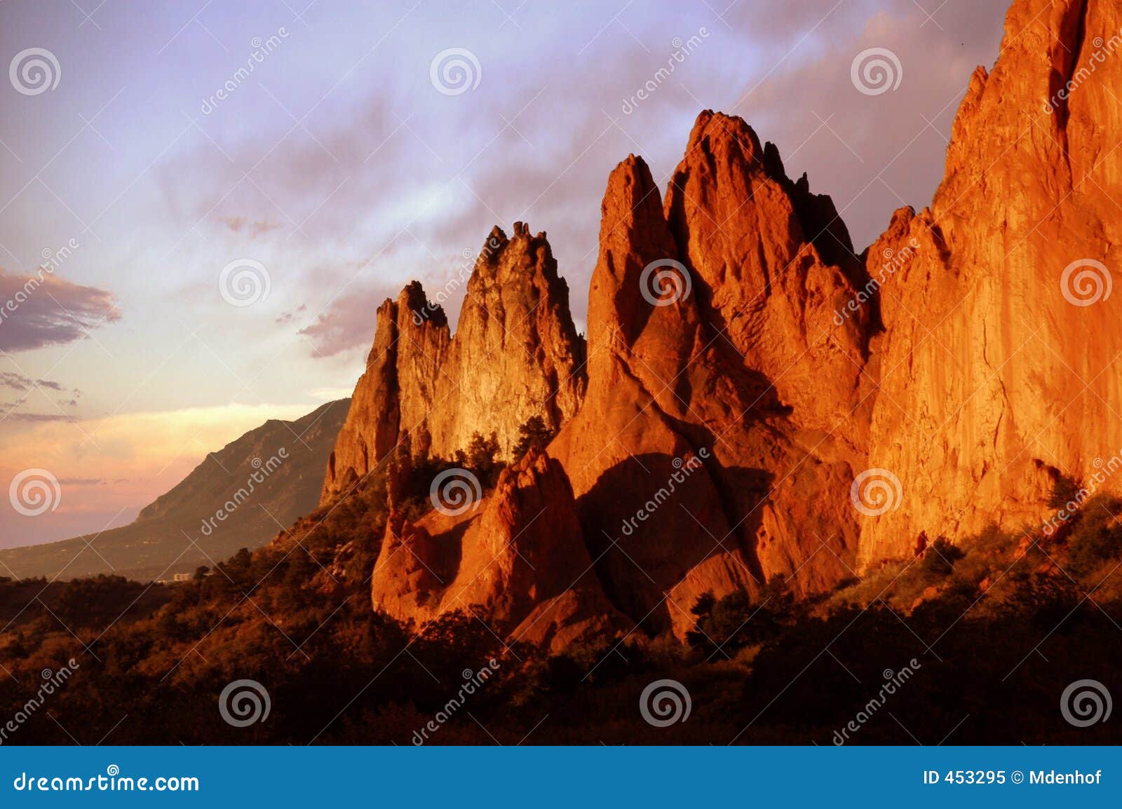 Beautiful Red Rocks in Morning Light with Multi-colored Sky Stock Image ...
