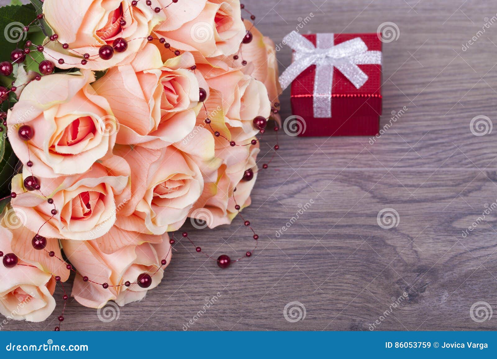 Beautiful Roses and a Gift Box Stock Image - Image of celebrate ...