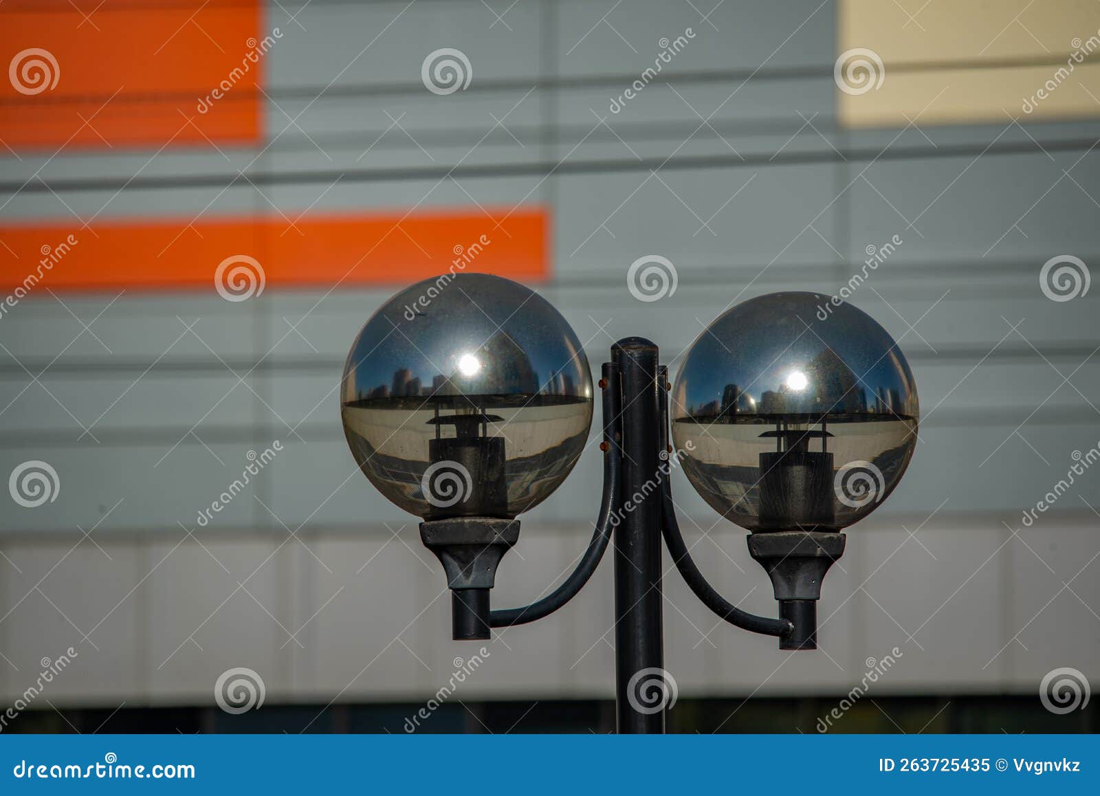 Beautiful, Round Street Lights with the Reflection of a Building in ...