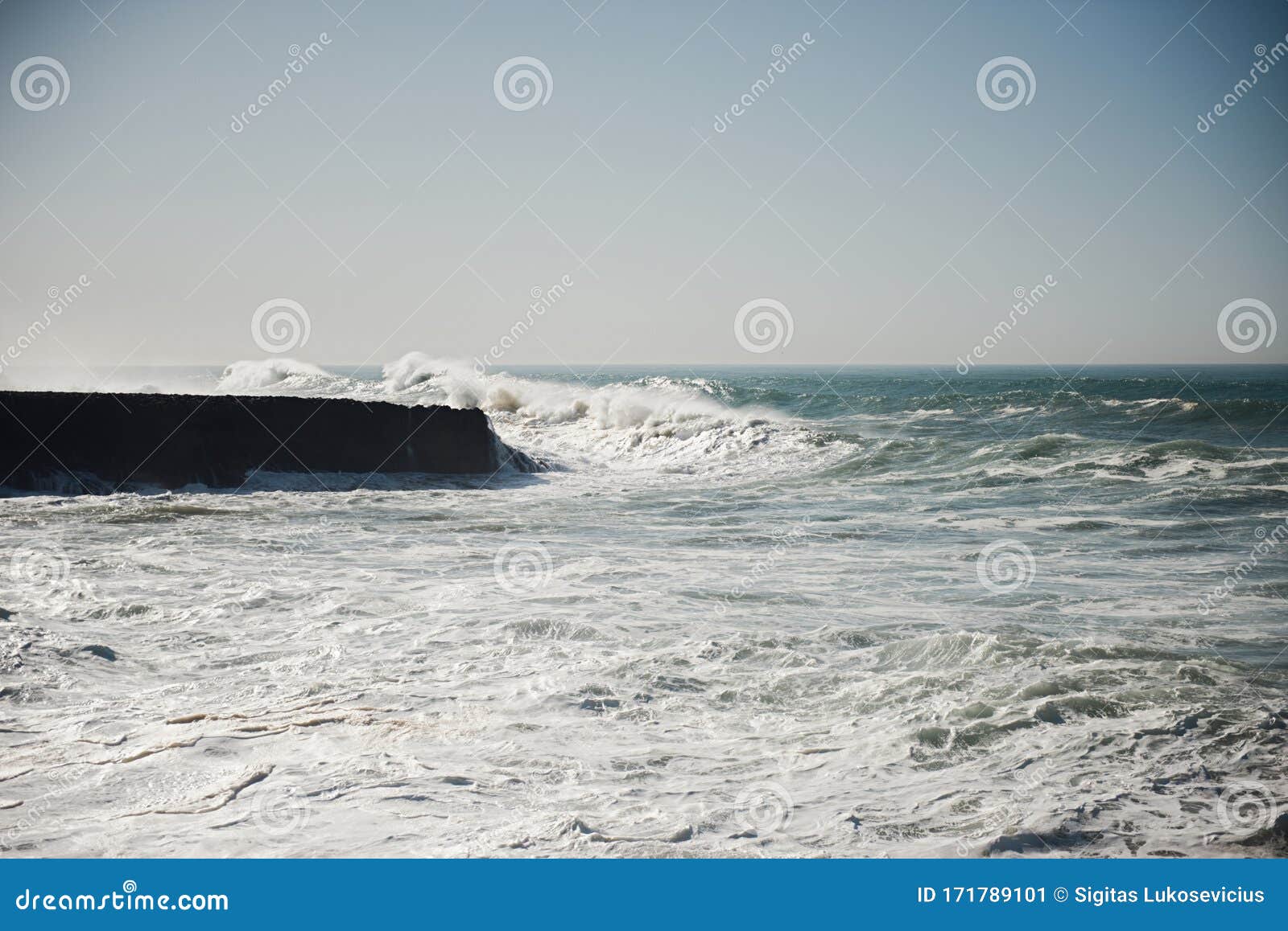 Beautiful Rugged Coastline with Waves Crashing Against the Cliffs Stock ...