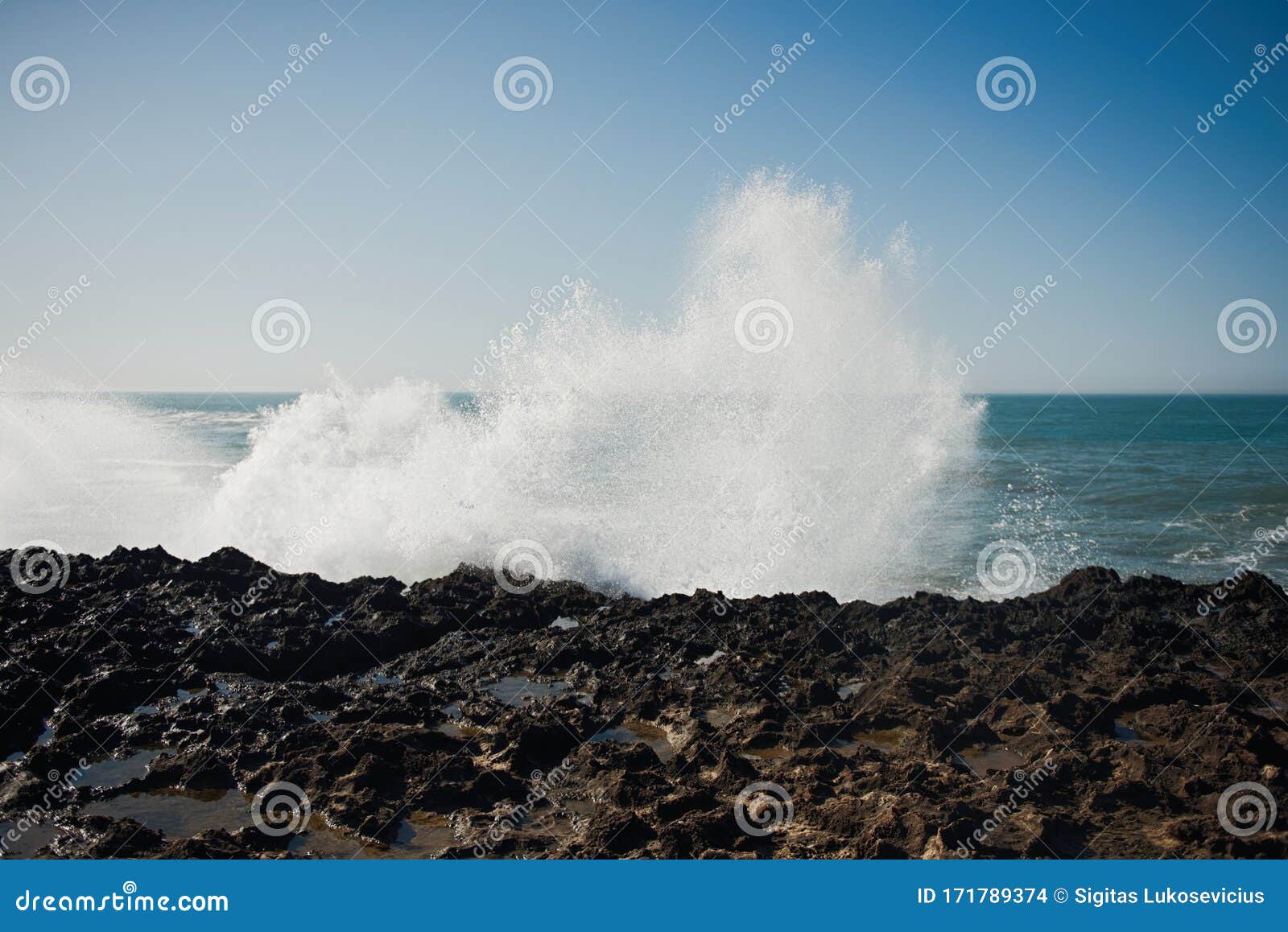 Beautiful Rugged Coastline with Waves Crashing Against the Cliffs Stock ...