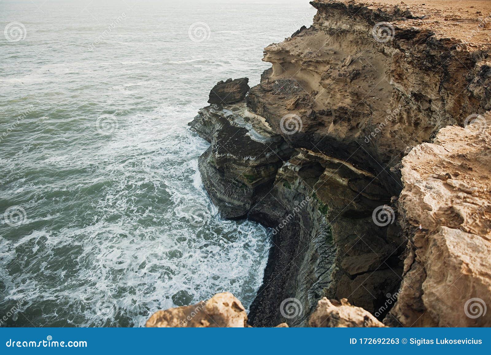 Beautiful Rugged Coastline with Waves Crashing Against the Cliffs Stock ...
