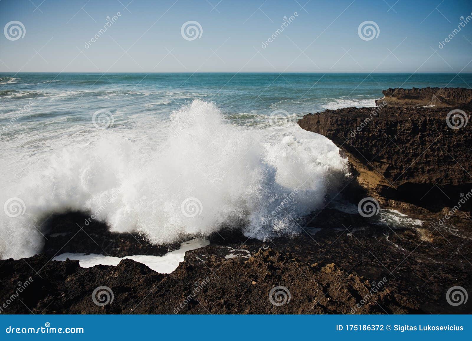 Beautiful Rugged Coastline with Waves Crashing Against the Cliffs Stock ...