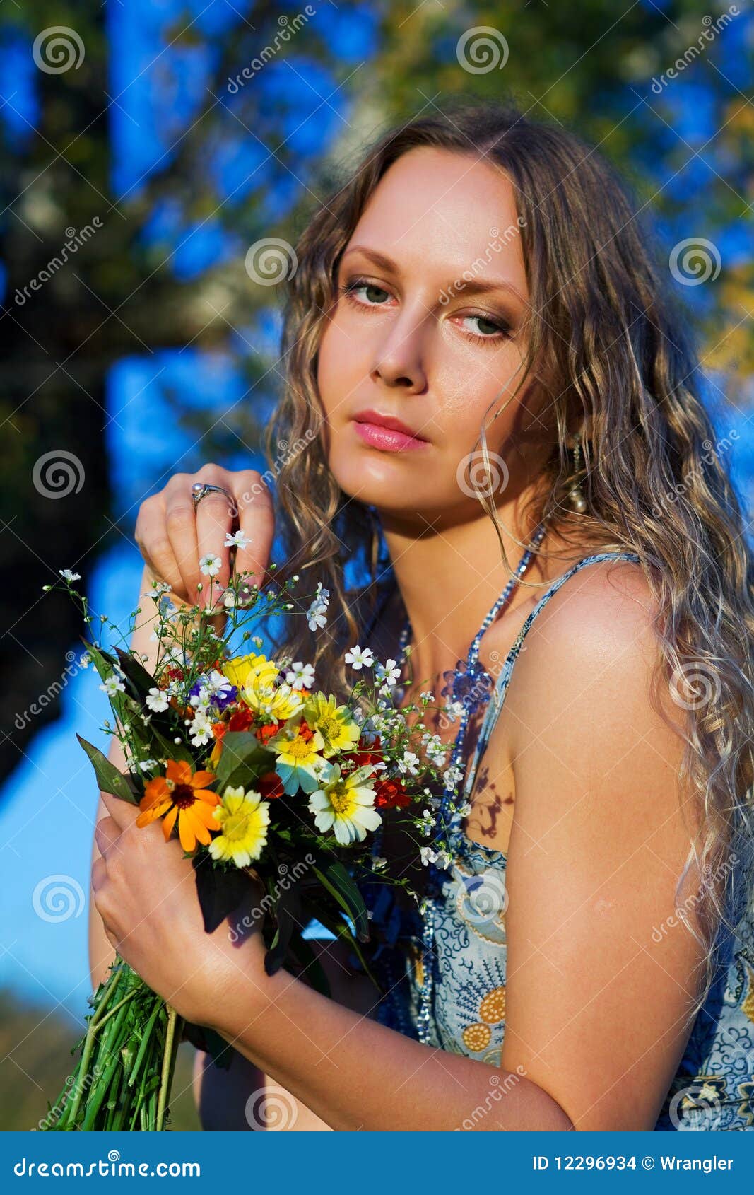 Beautiful Sad Woman with a Flowers. Stock Photo - Image of hair, active ...