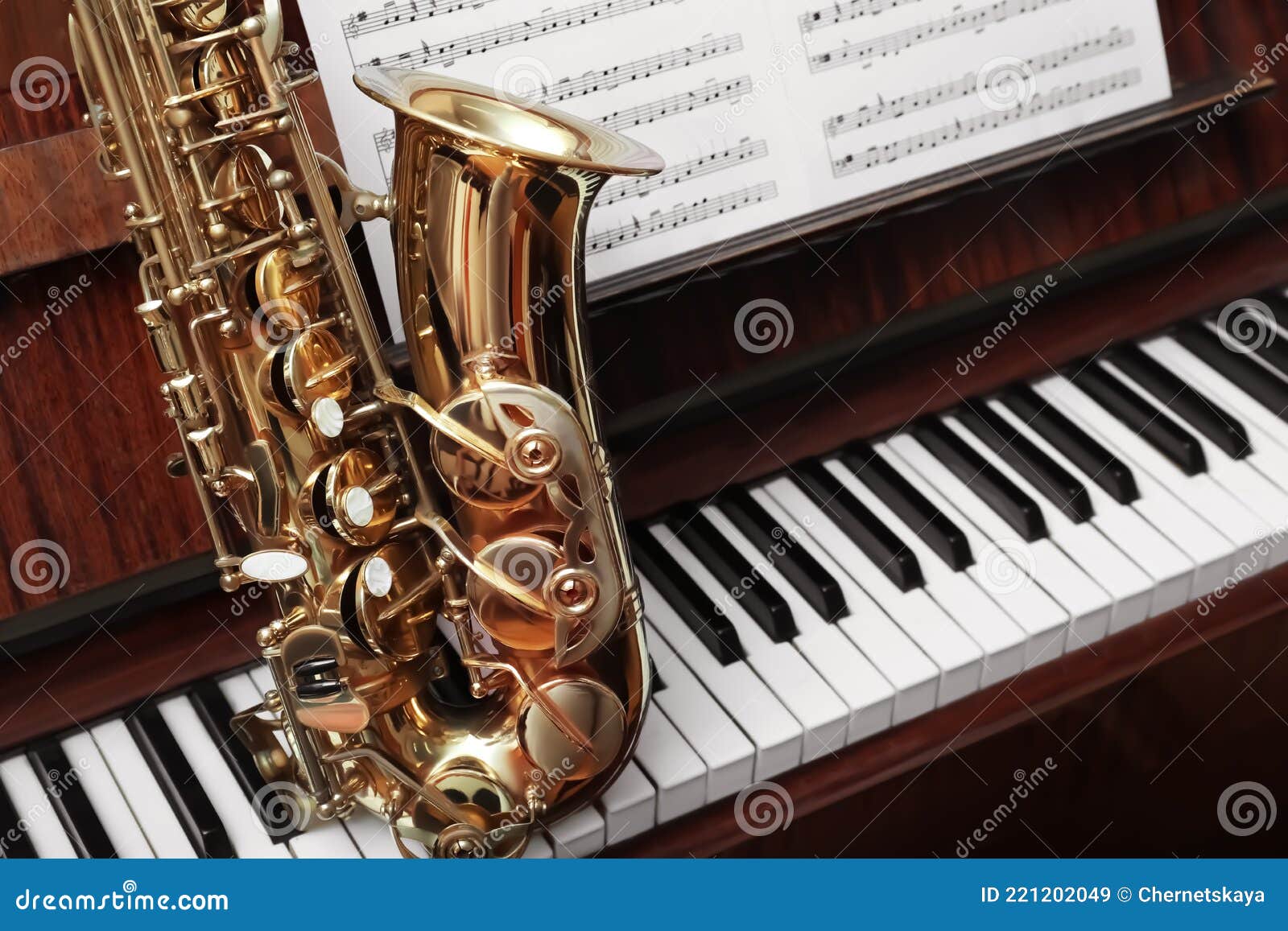 Beautiful Saxophone on Piano. Musical Instruments Stock Image - Image ...