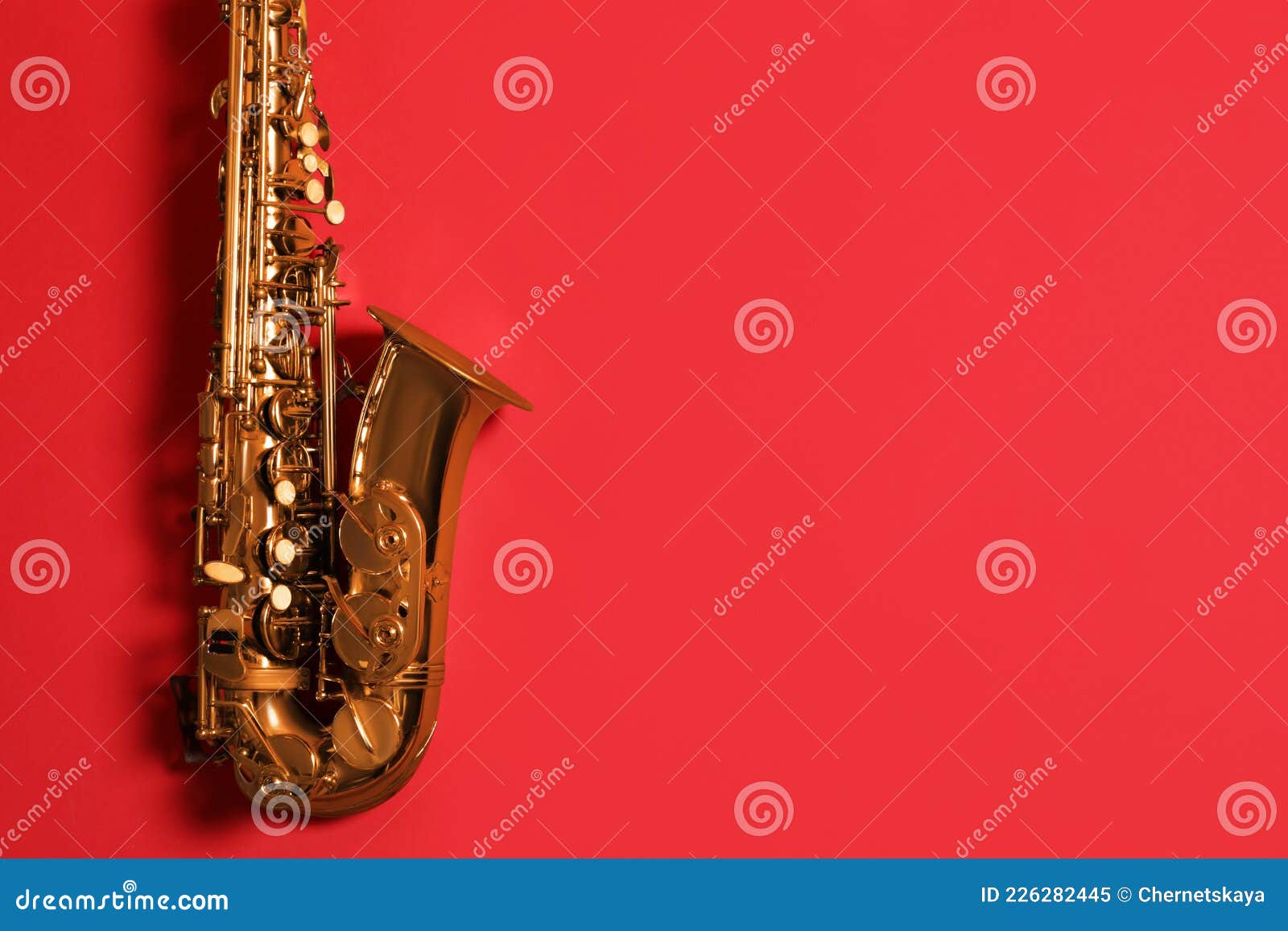 Beautiful Saxophone on Red Background, Top View. Space for Text Stock ...