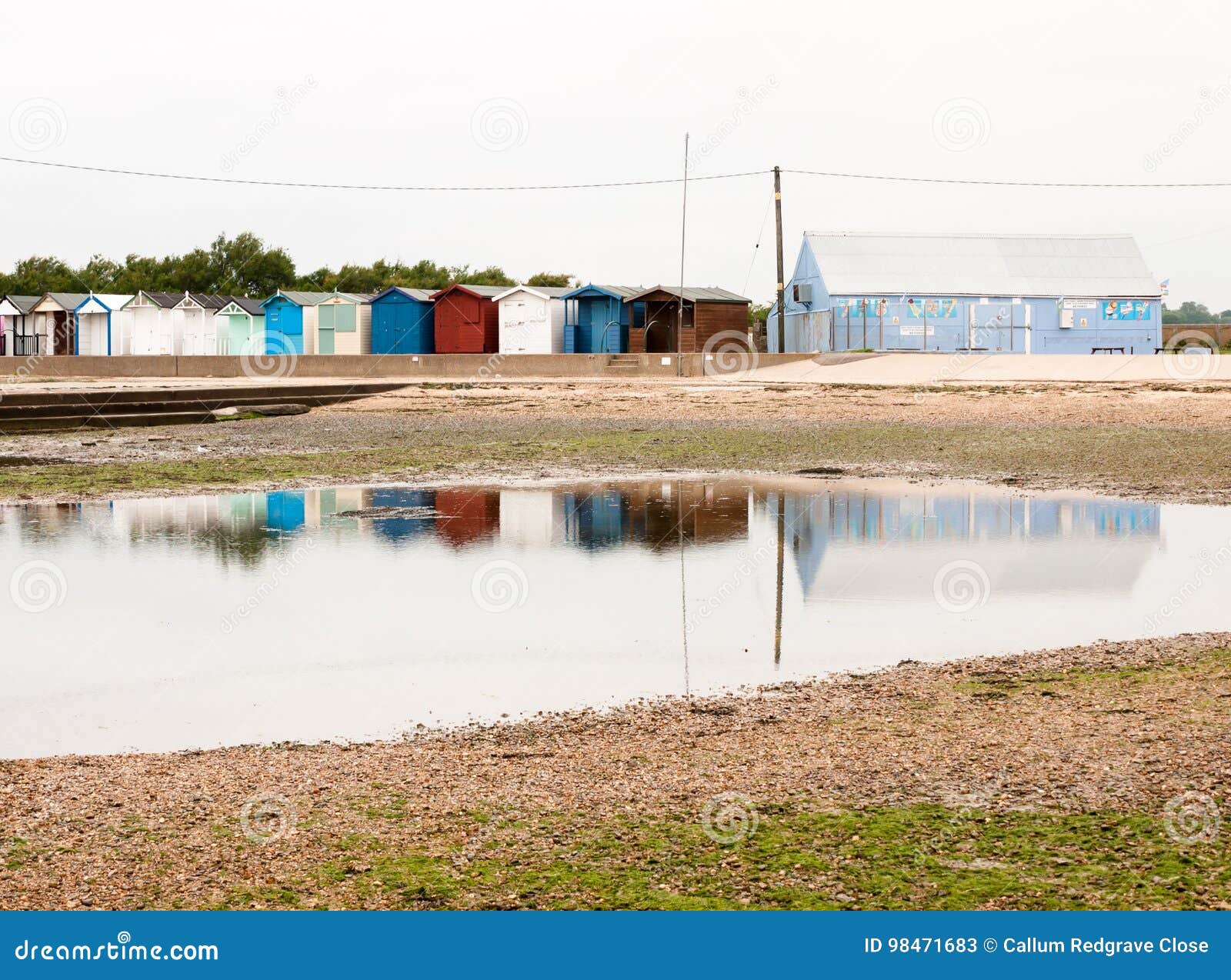 Beautiful Scene of Beach Huts with Reflections in Water in Front Stock ...