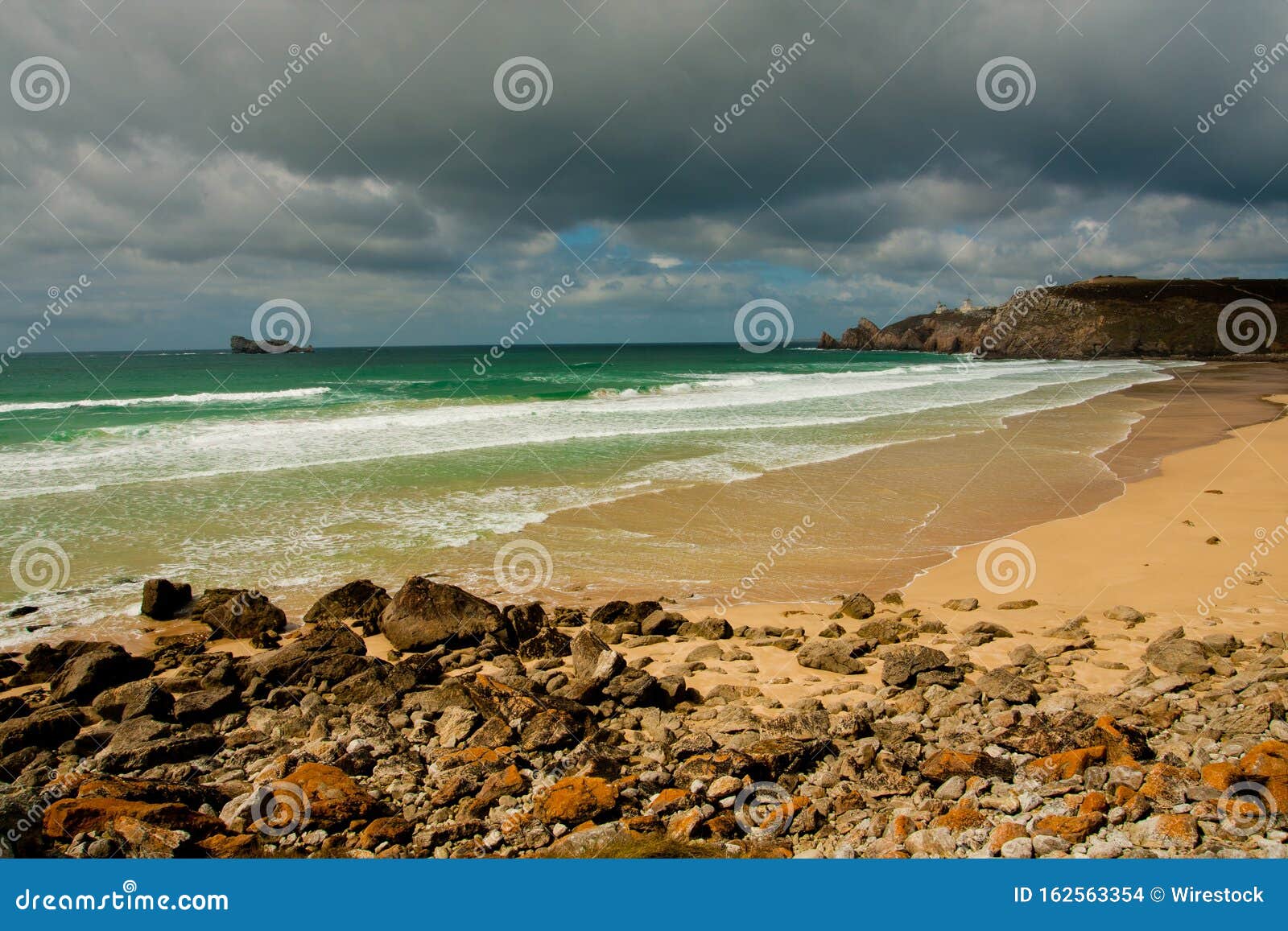 Beautiful Scenery of a Calm Beach Under the Cloudy Sky Stock Photo ...