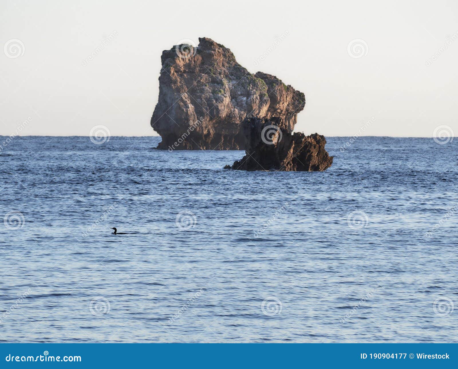 Beautiful Scenery of the Peaceful Sea Surrounded by Rock Formations ...