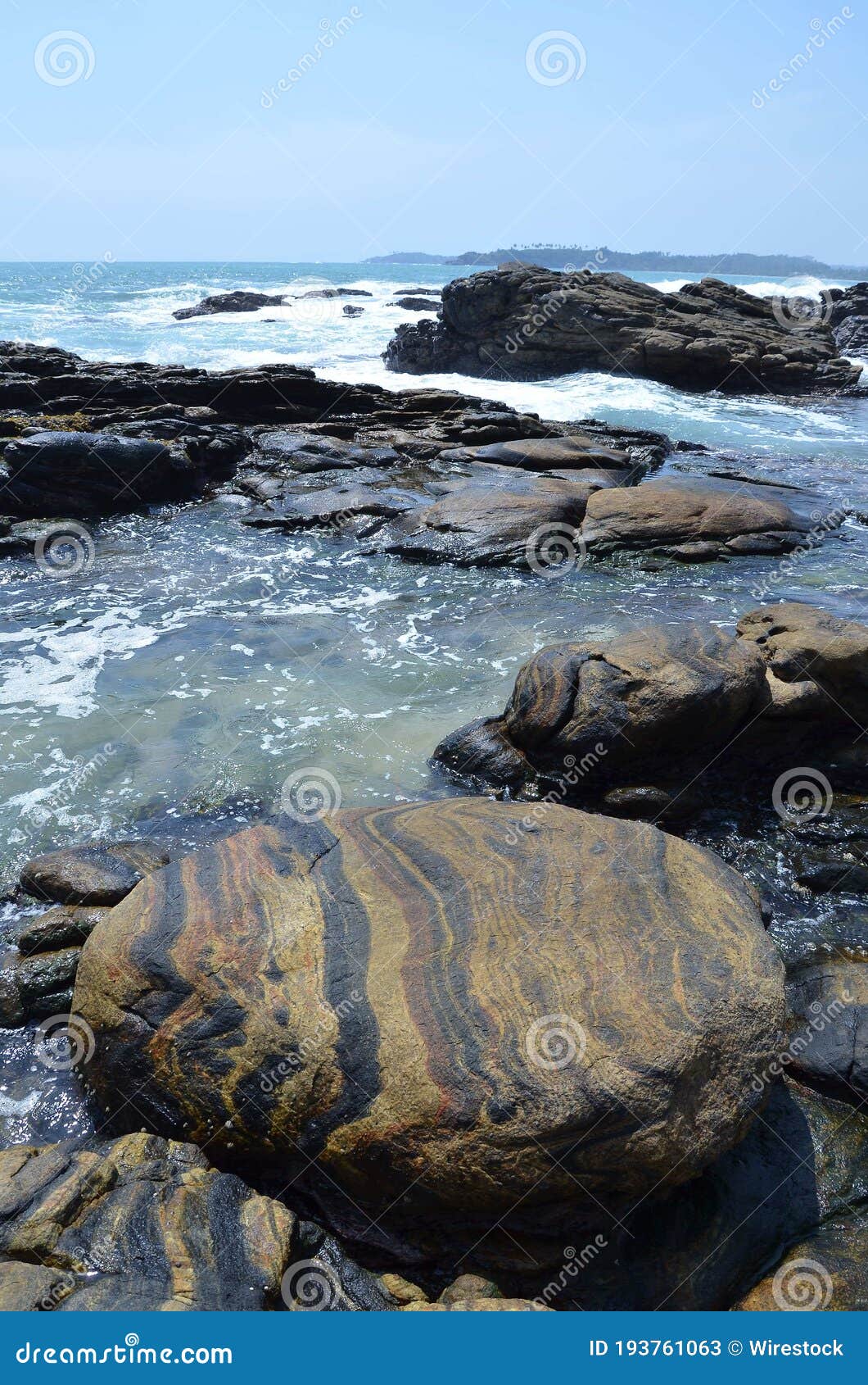 Beautiful Scenery of Rock Formations on the Beach with Splashing Sea ...