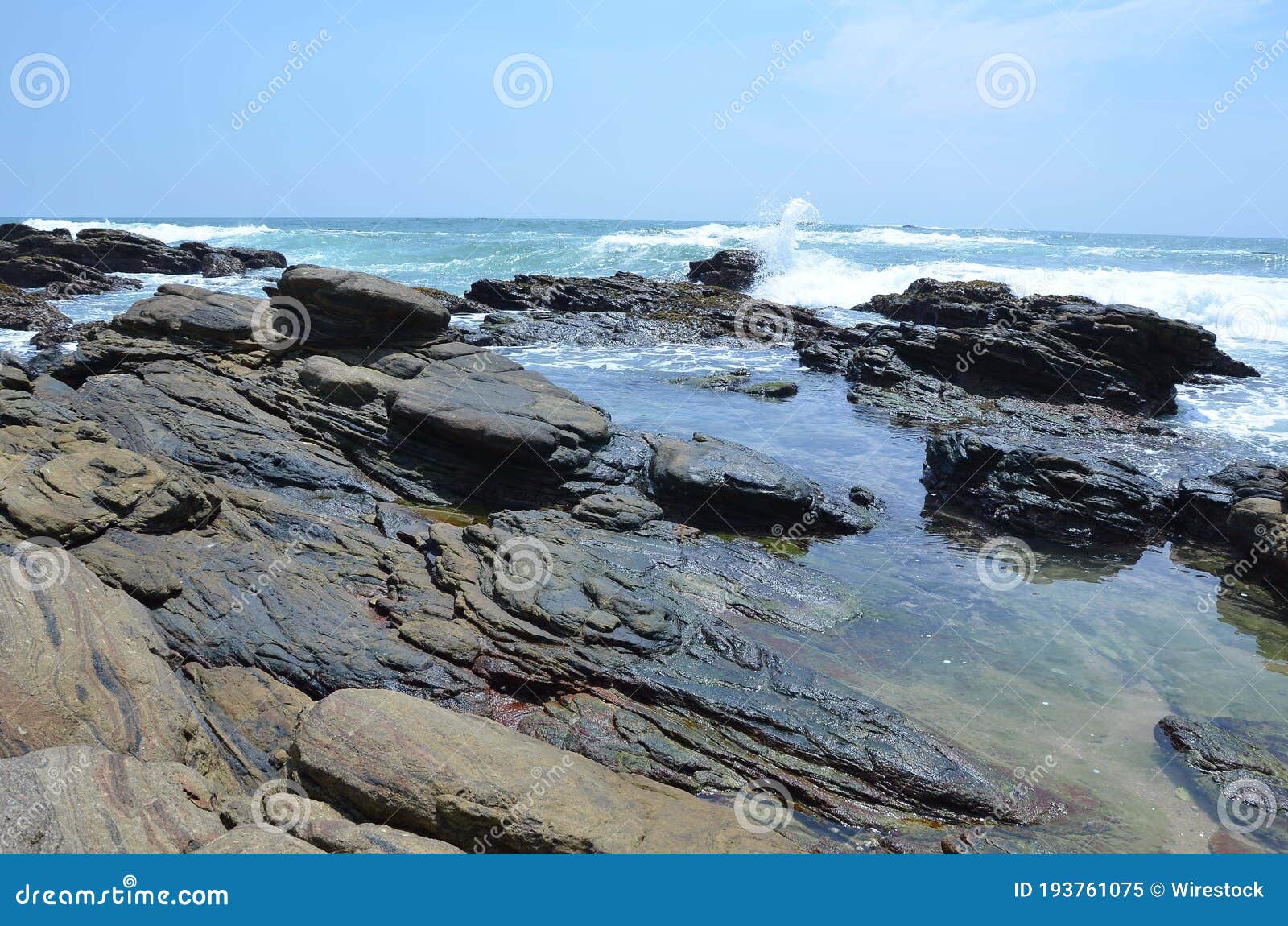 Beautiful Scenery of Rock Formations on the Beach with Splashing Sea ...