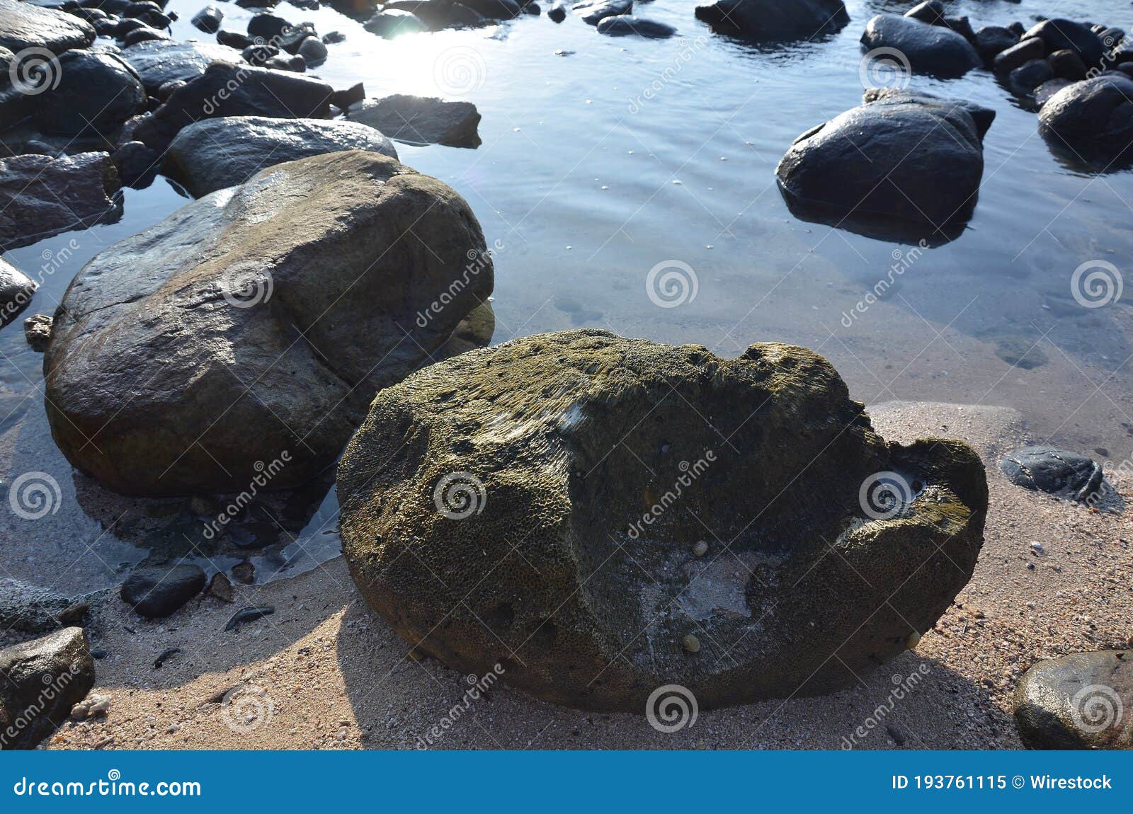 Beautiful Scenery of Rock Formations on the Beach with Splashing Sea ...