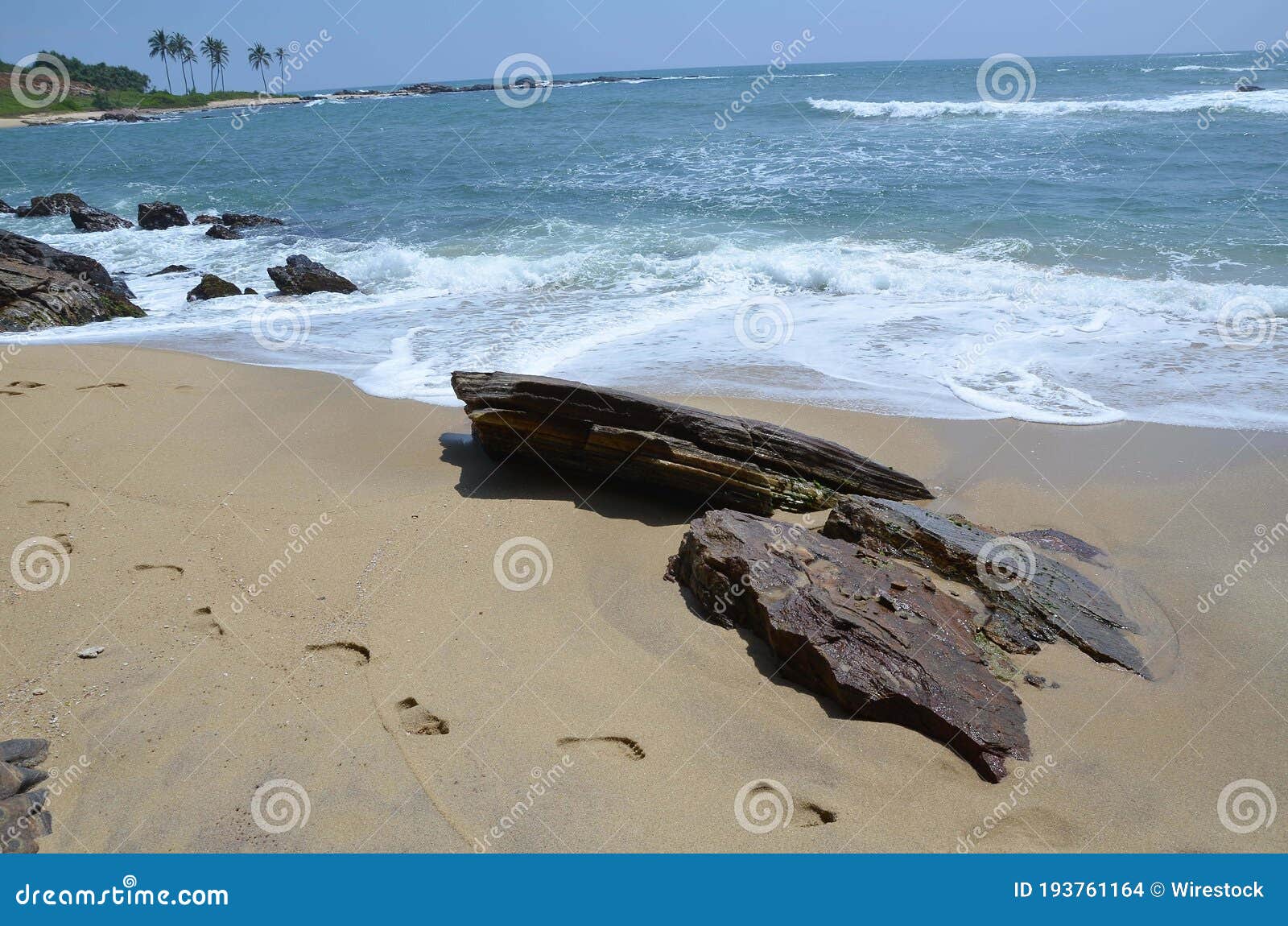 Beautiful Scenery of Rock Formations on the Beach with Splashing Sea ...