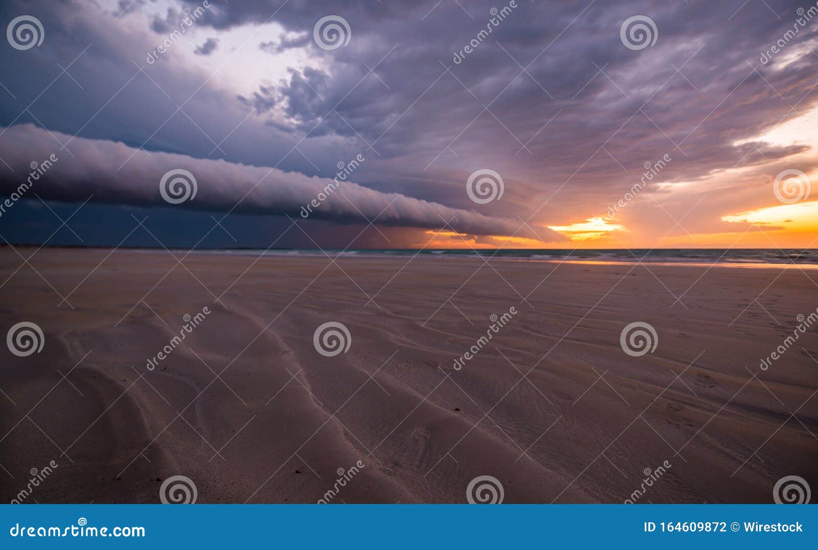 Beautiful Scenery of a Sandy Beach Under the Breathtaking Cloud ...
