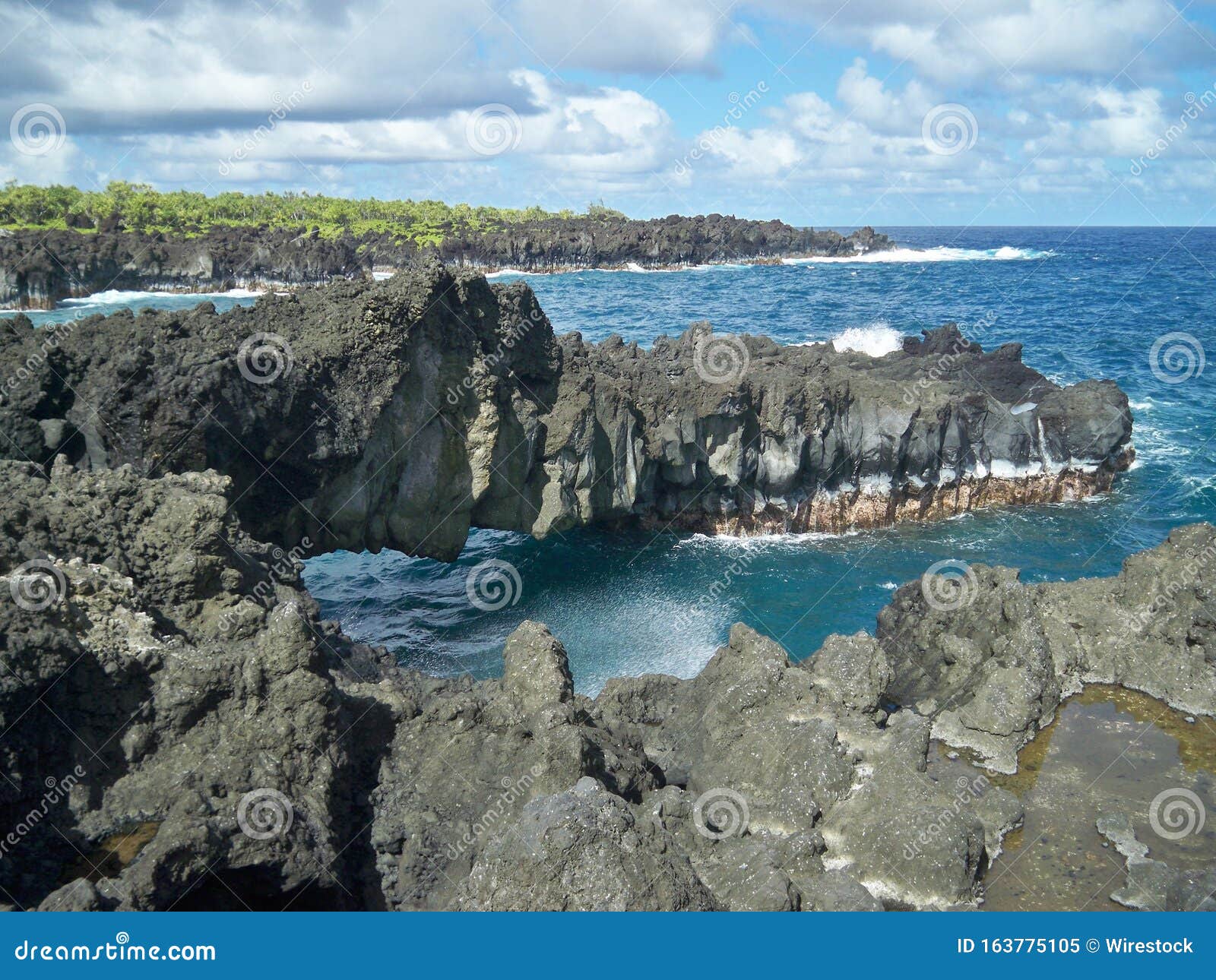 Beautiful Scenery of Sharp Rock Formations at the Beach Under the ...