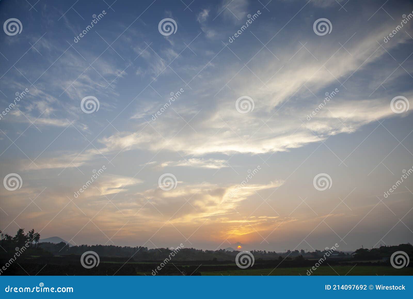 Beautiful Scenery of the Sunset Sky Over a Landscape with Trees Stock ...