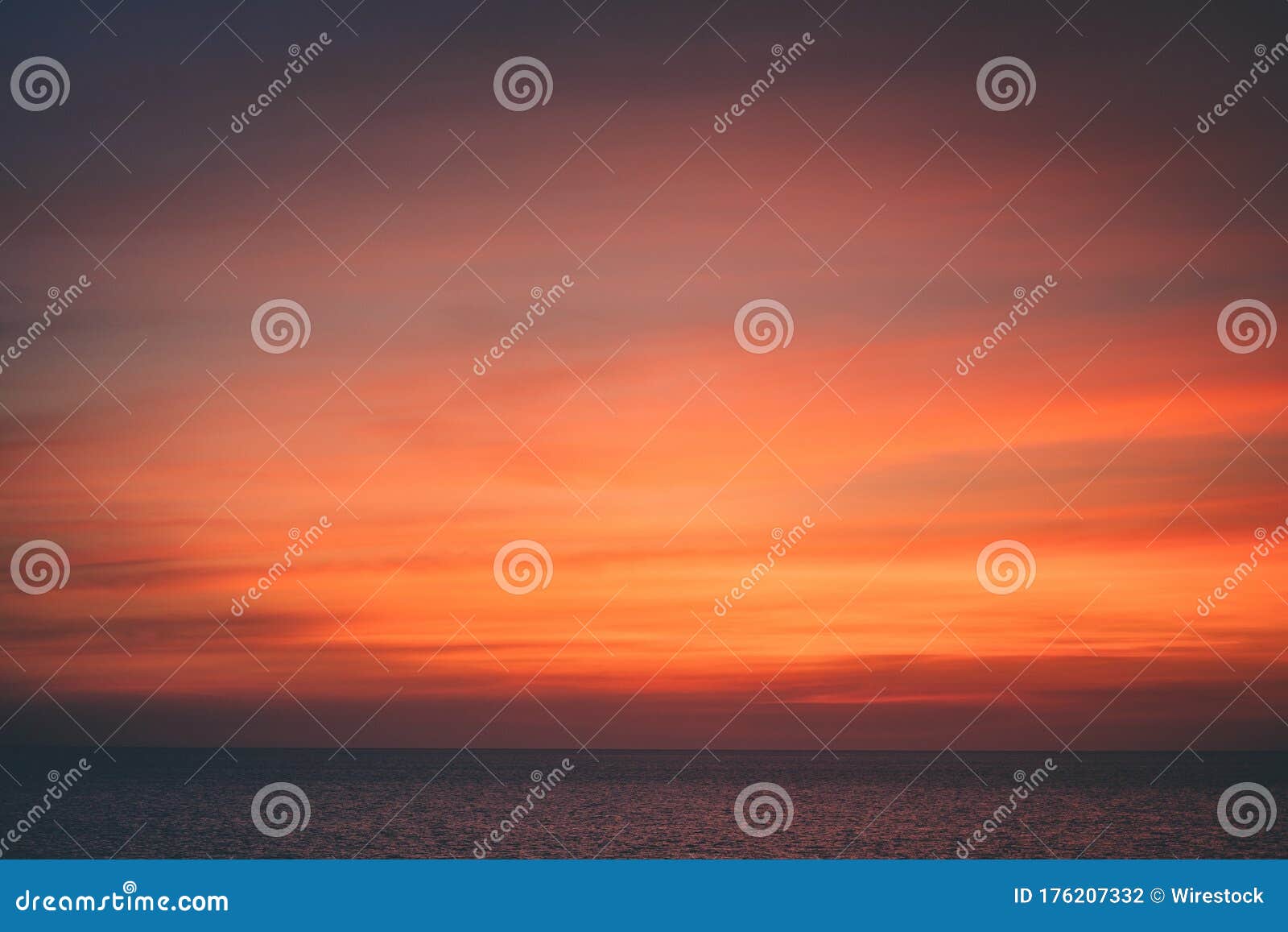 Beautiful Scenery of the Sunset Sky Over the Peaceful Sea Stock Photo ...