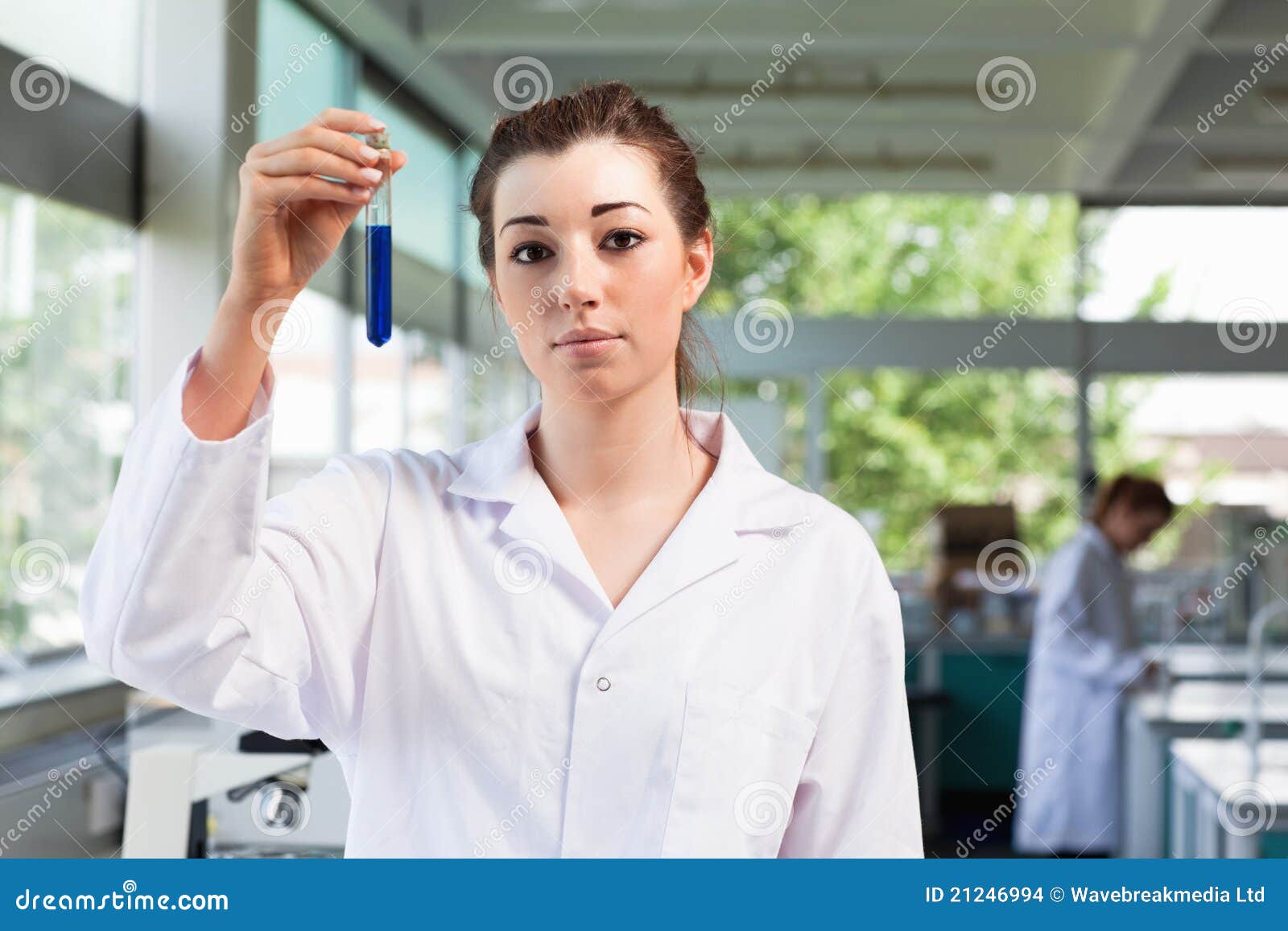 Beautiful Scientist Holding a Test Tube Stock Photo - Image of glass ...