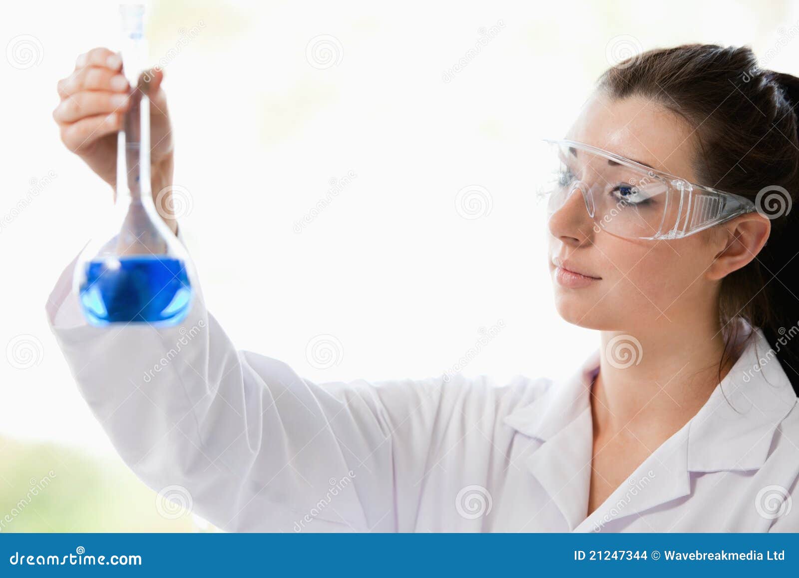 Beautiful Scientist Looking at a Flask Stock Photo - Image of person ...