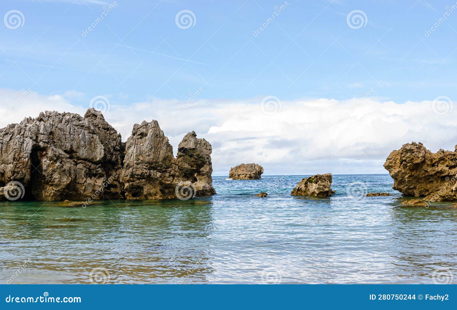 A Beautiful Sea Surface with Sharp Old Dramatic Rocks in the Sea. Stock ...