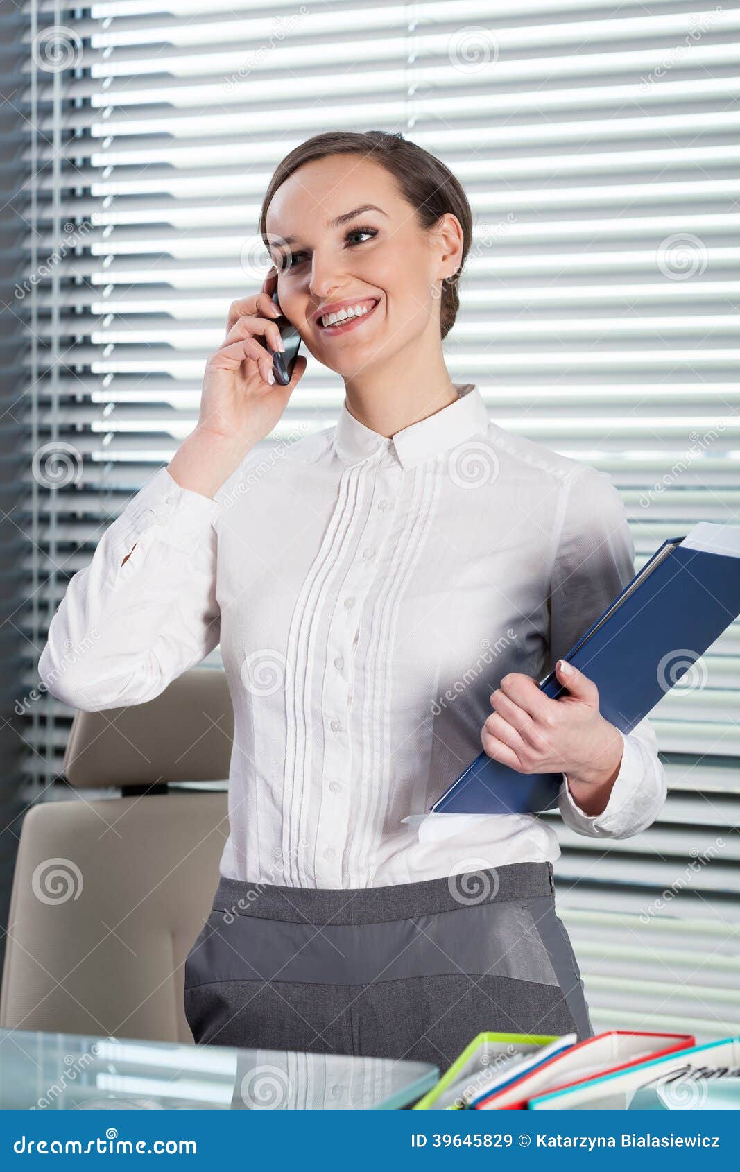 Beautiful Secretary Talking at the Phone Stock Image - Image of ...