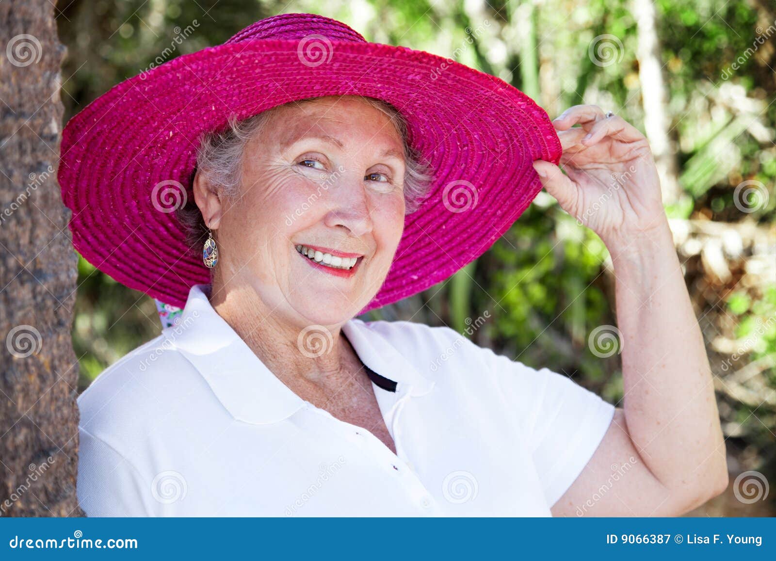 Beautiful Senior Lady Tips Hat Stock Image - Image of straw, happy: 9066387