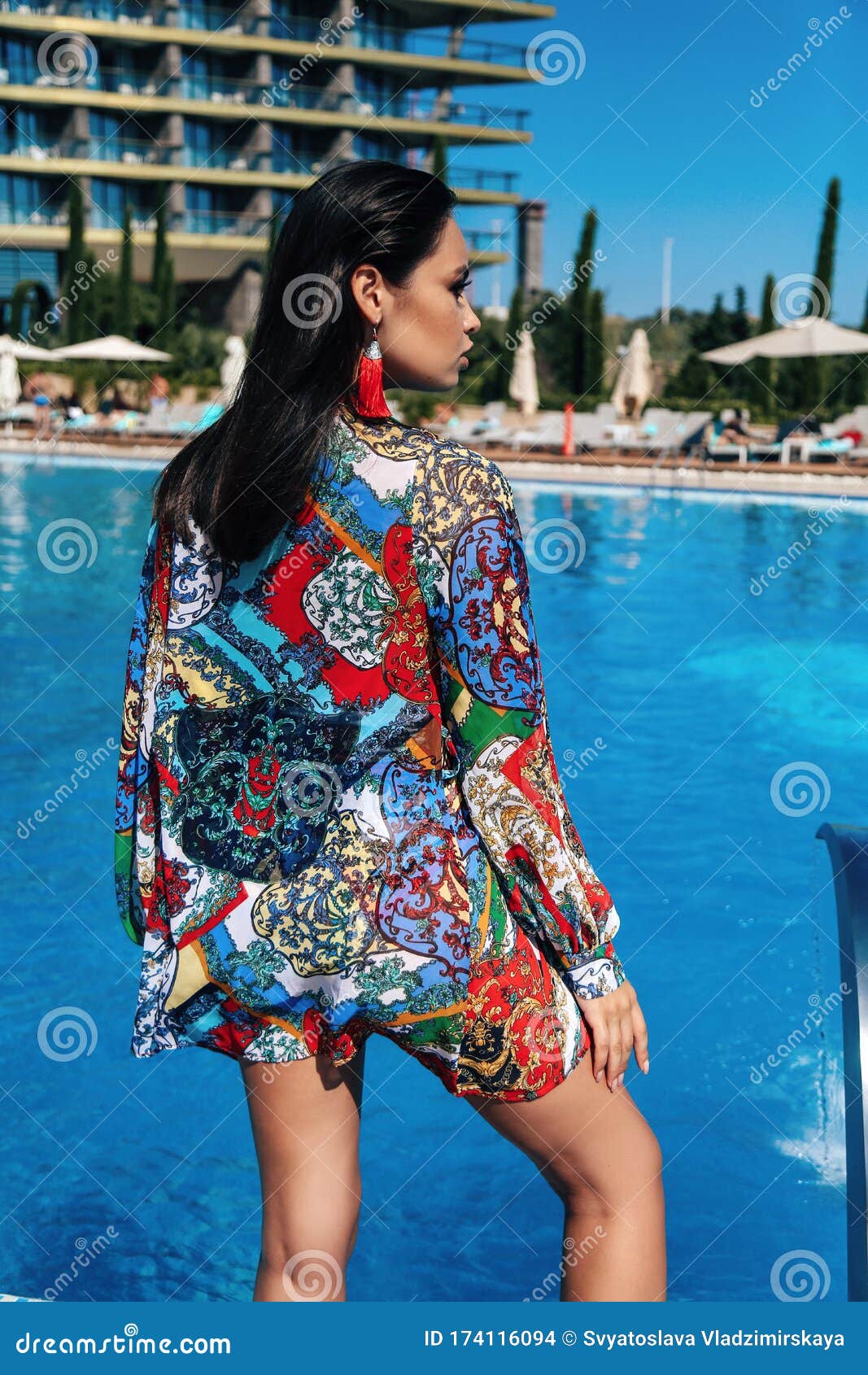 Beautiful Sensual Woman With Dark Hair In Elegans Swimming Suit