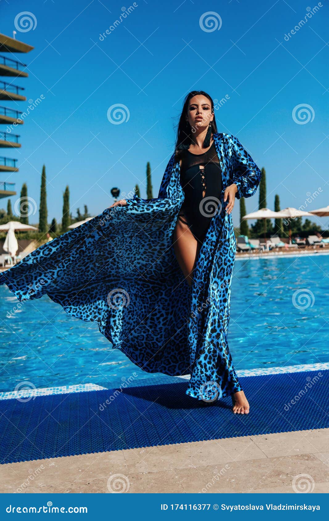 Beautiful Sensual Woman With Dark Hair In Elegans Swimming Suit