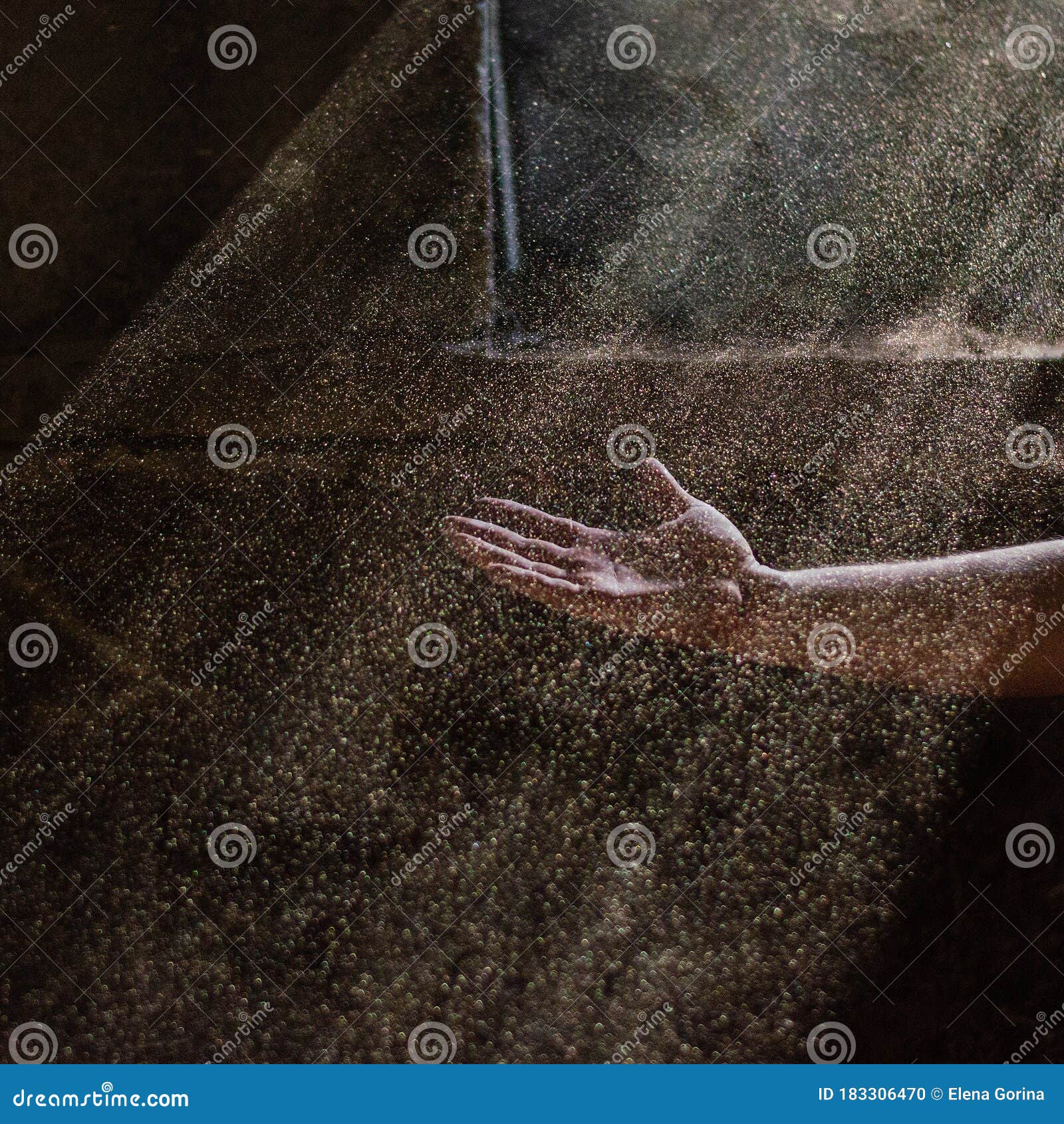 Beautiful Set of Dust Particles and a Hand Against the Background of ...