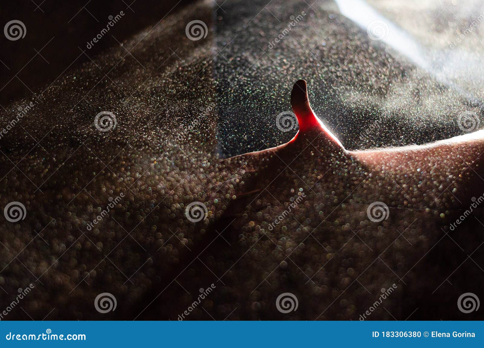 Beautiful Set of Dust Particles and Thumb Against the Background of ...