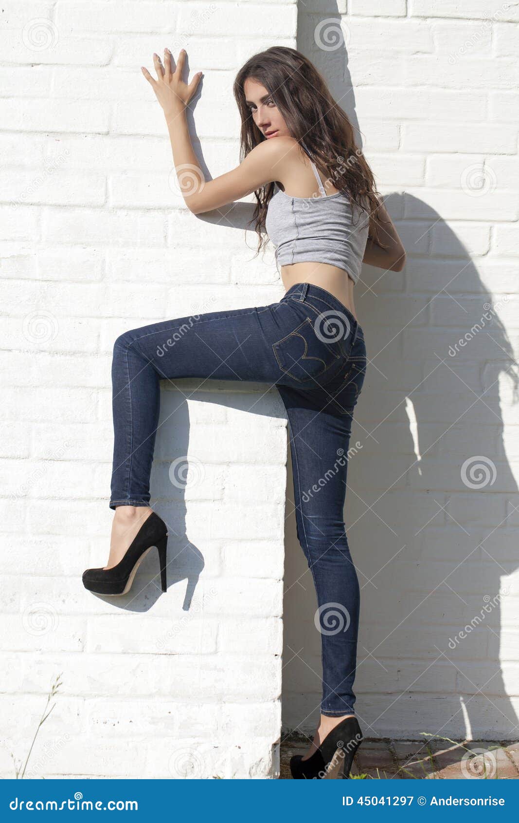 Beautiful Young Brunette In Blue Jeans Stock Image Image Of Face