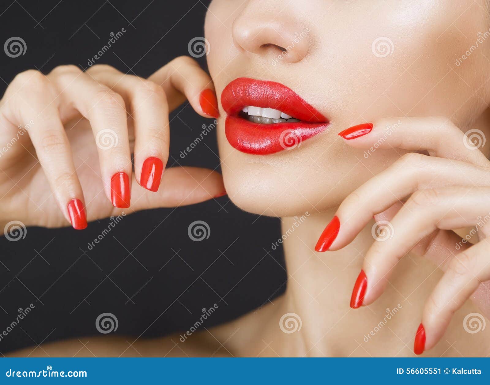 Beautiful Young Girl With Red Lips And Red Nail Polish Stock Image