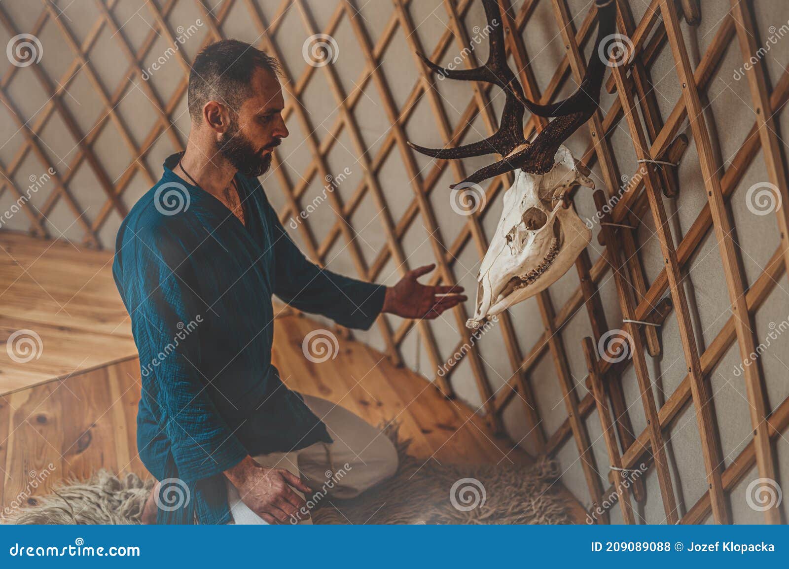 Beautiful Shamanic Man with Deer Skull in Yurt. Stock Photo - Image of ...