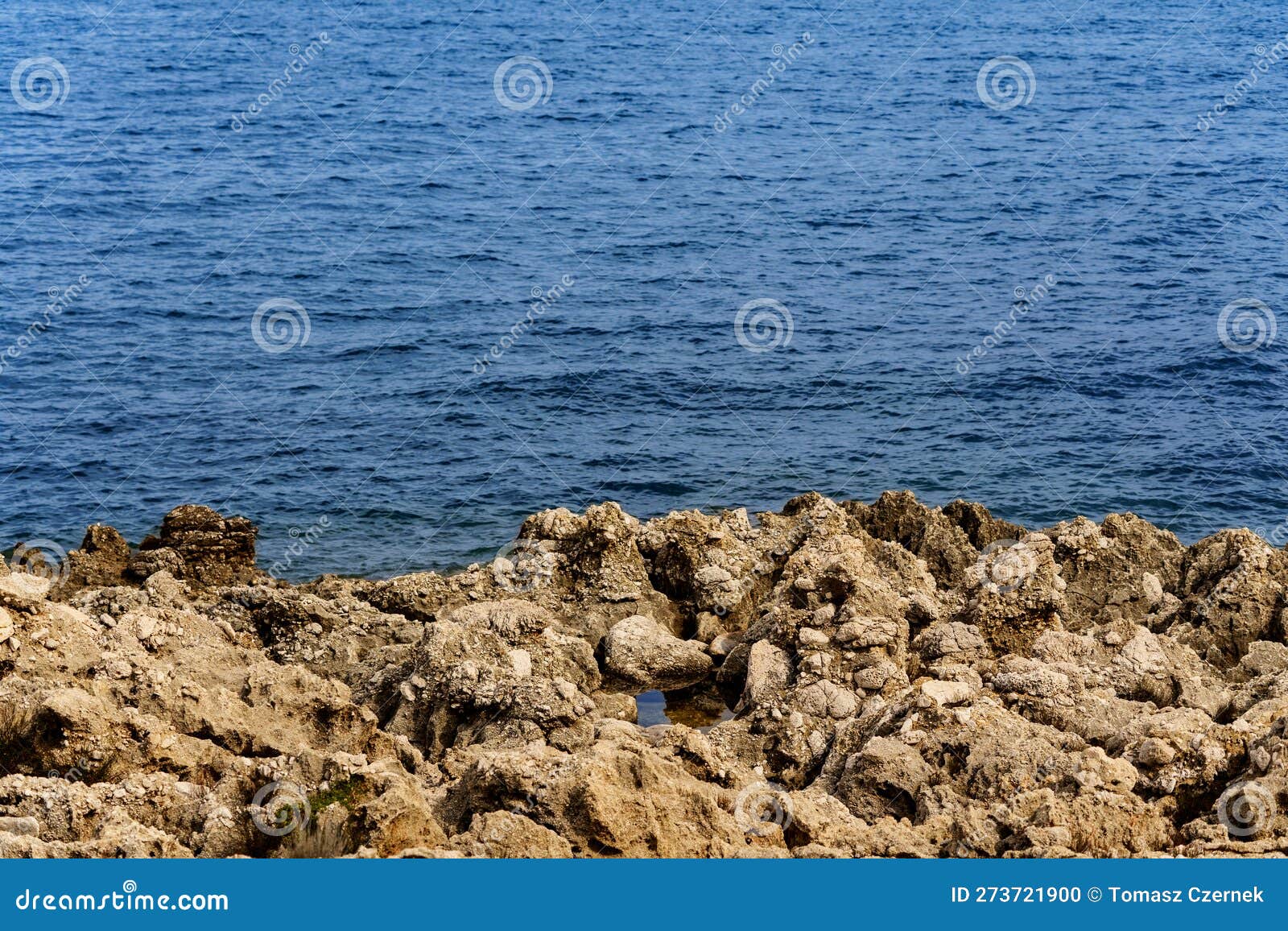 A Beautiful Shore, Topped with Sharp Coastal Rocks Cutting the Sea ...