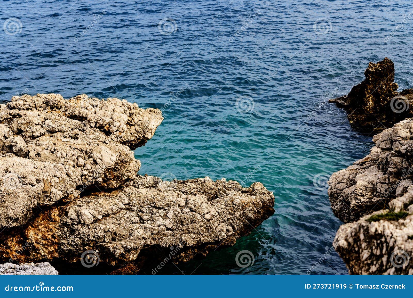 A Beautiful Shore, Topped with Sharp Coastal Rocks Cutting the Sea ...