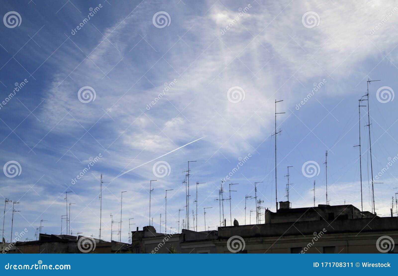 Beautiful Shot of a Blue Cloudy Sky Over Buildings Stock Image - Image ...