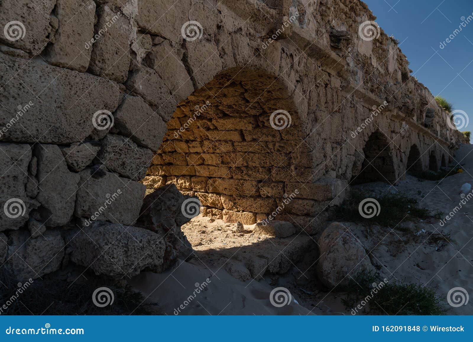 Beautiful Shot of a Brick Bridge with a Blue Sky in the Background ...