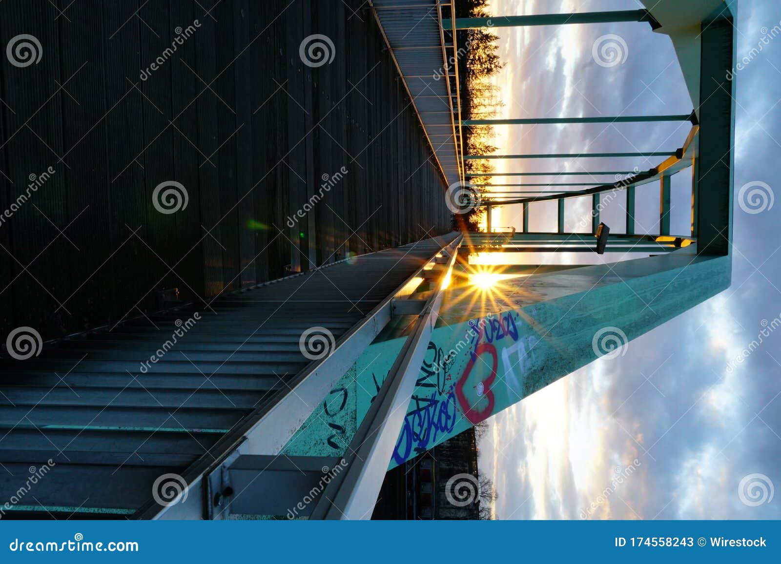Beautiful Shot of the Bridge Covered in Graffiti during Sunset Stock ...