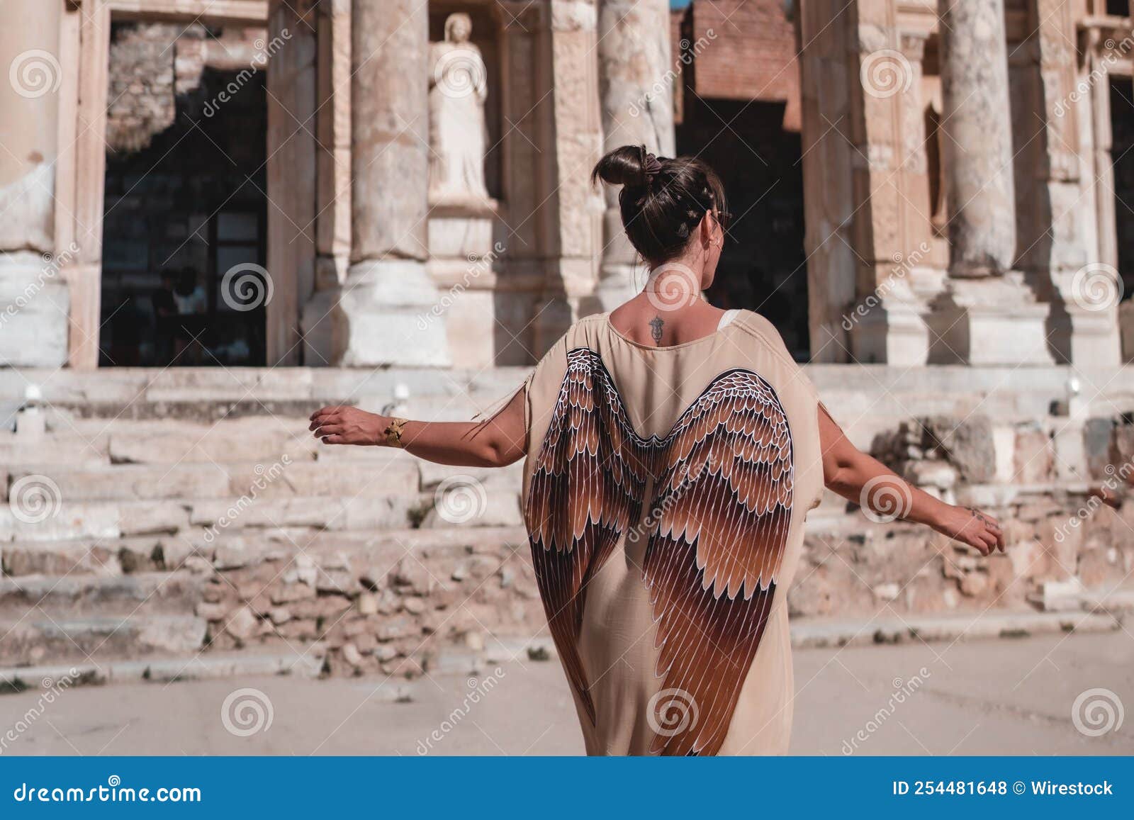 Beautiful Shot of a Female Exploring the Ephesus Ancient City in Izmir ... Beautiful Shot of a Female Exploring the Ephesus Ancient City in Izmir ...
