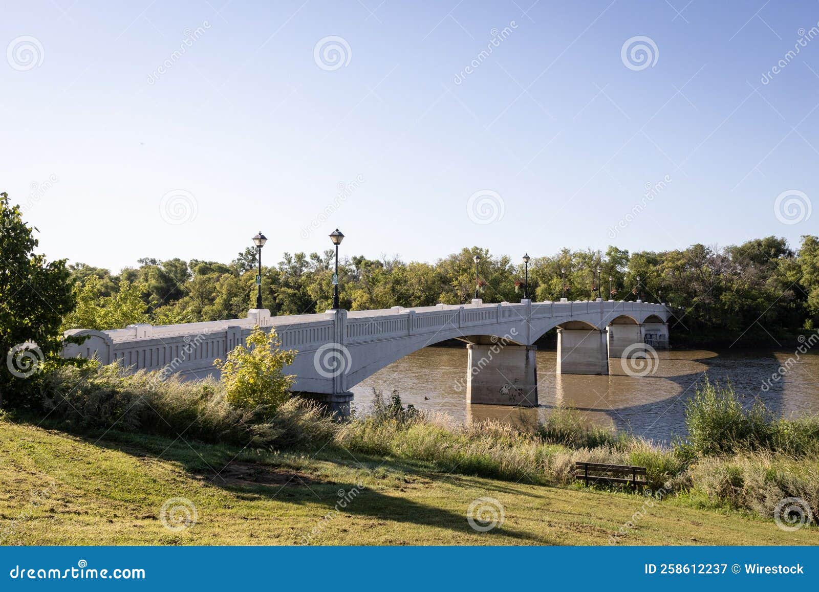 Beautiful Shot of a Footbridge Over a River Surrounded by Trees and ...