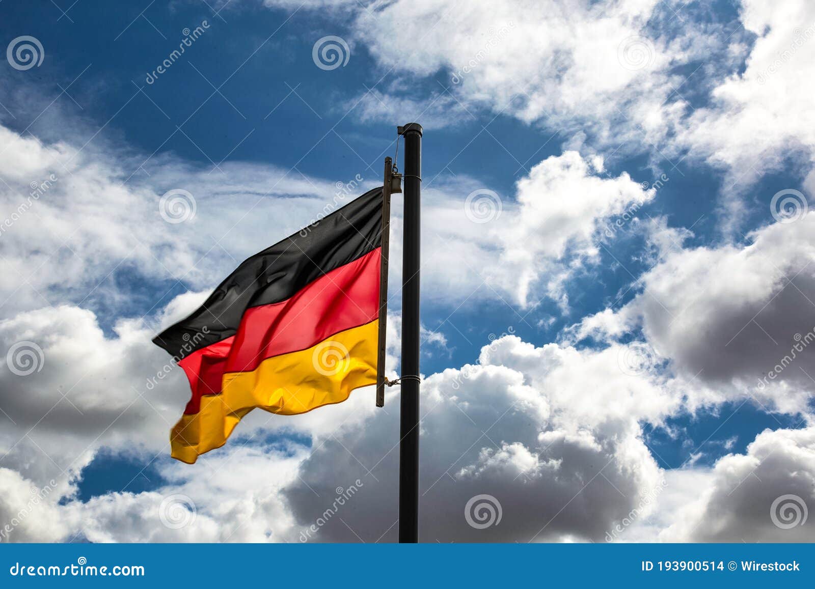 Beautiful Shot of a German Flag on a Pole Waving in the Wind with a ...