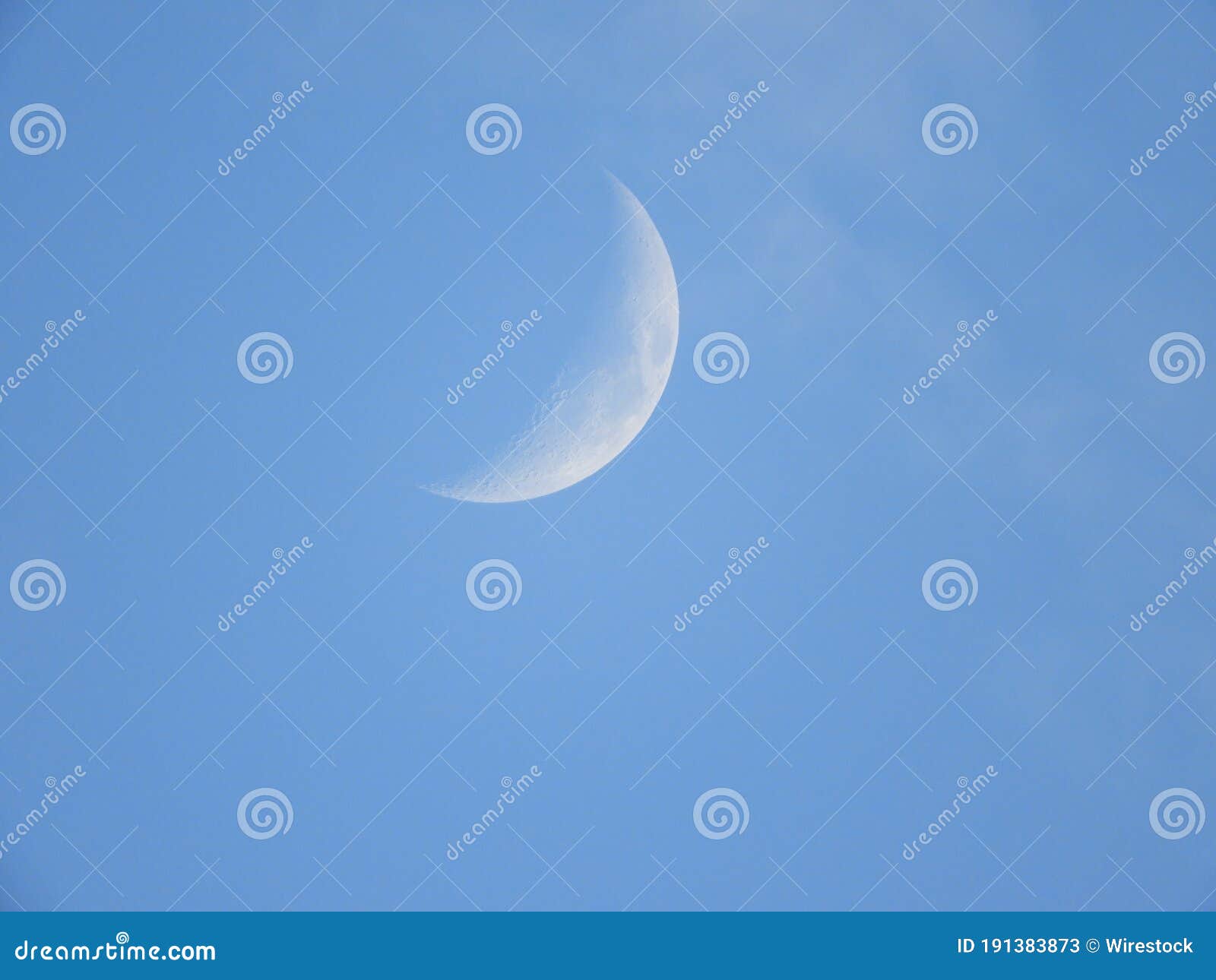 Beautiful Shot of a Light White Half-moon on a Blue Sky Background ...