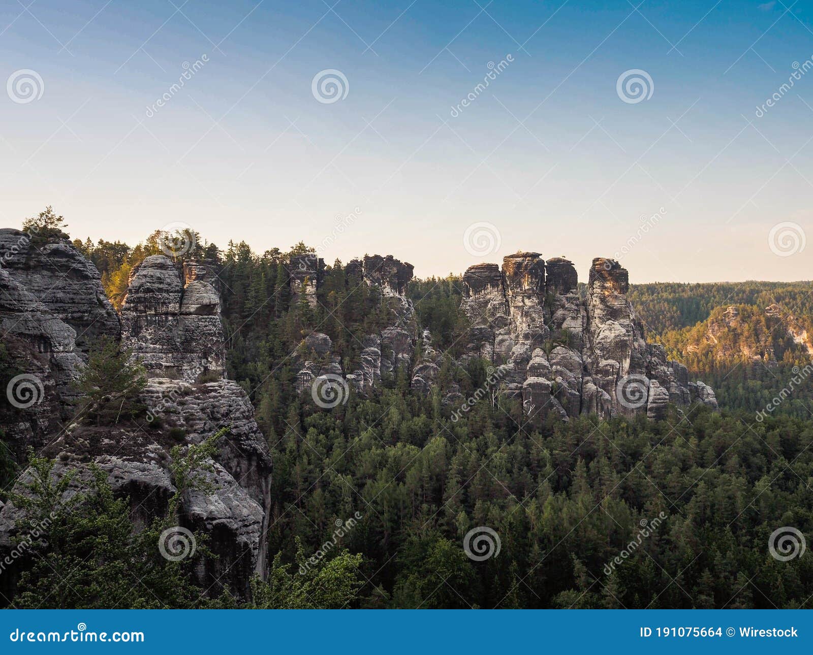 Beautiful Shot of Rock Columns on a Mountains Surrounded with Alpine ...