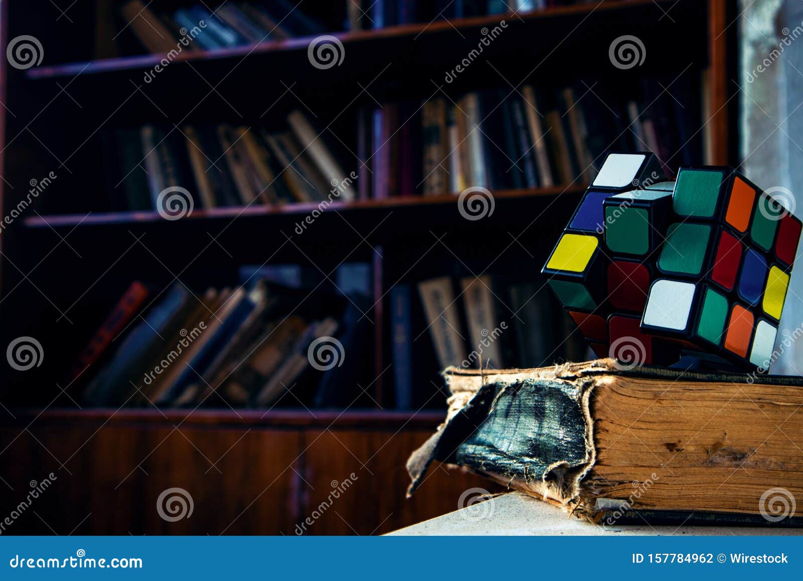 Beautiful Shot of a Rubik`s Cube on an Ancient Damaged Book in the ...