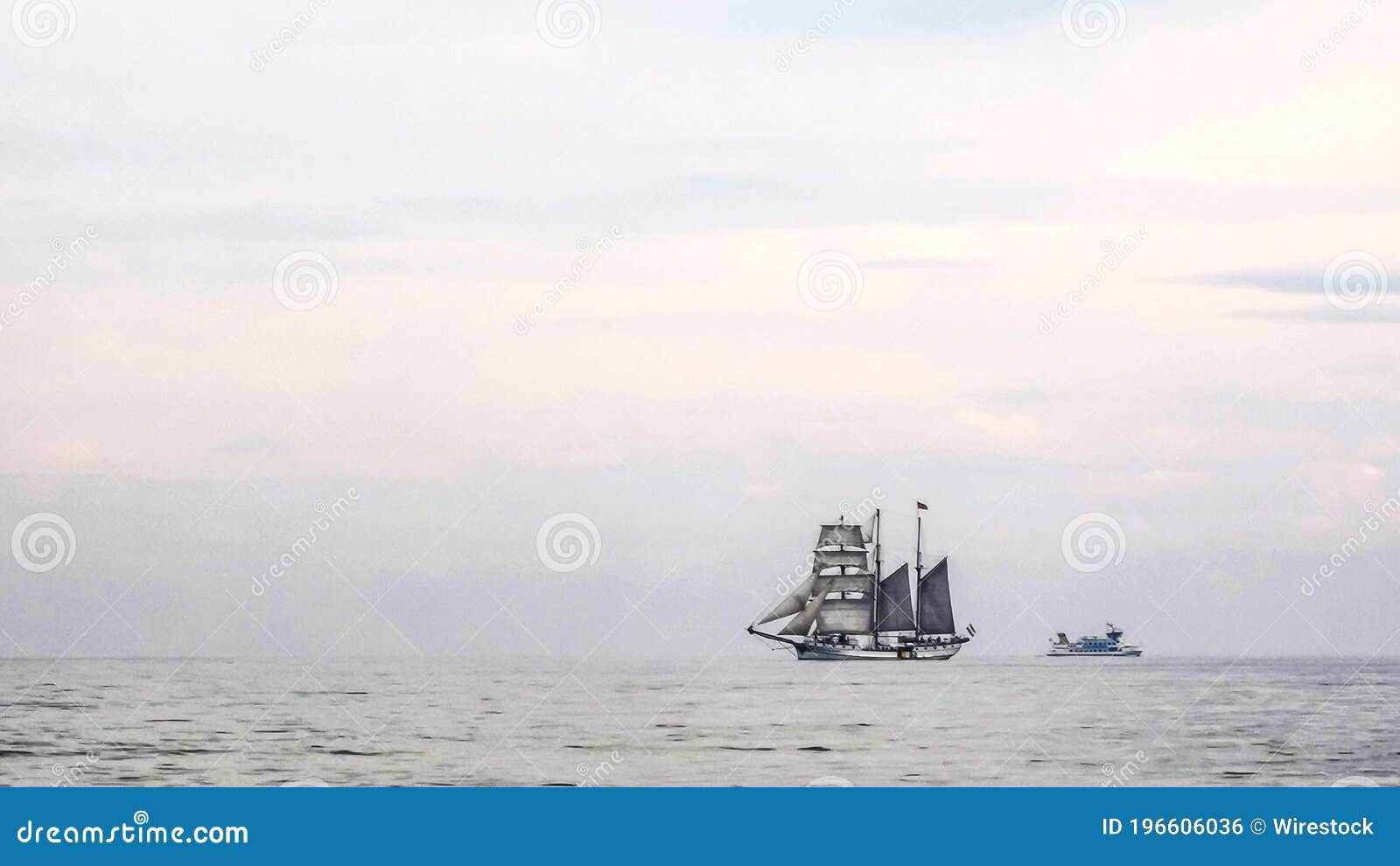 Beautiful Shot of a Ship with Sails Sailing Across the Ocean Stock ...
