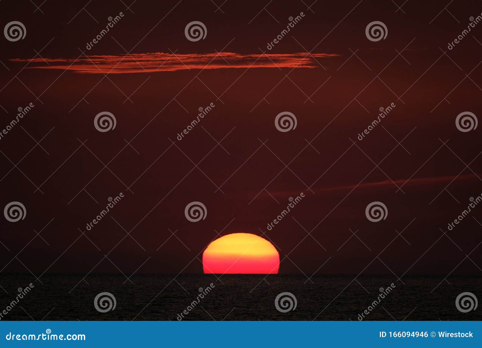Beautiful Shot of the Sun Going Down in a Red Sky Stock Photo - Image ...