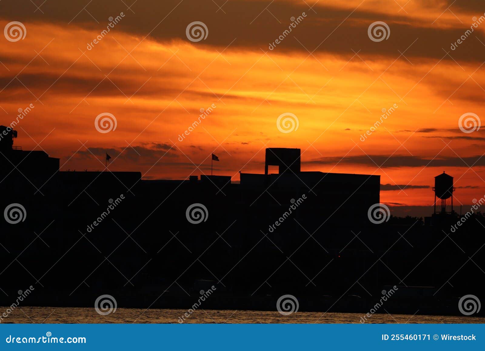 Beautiful Shot of a Sunset Over the Buildings Stock Image - Image of ...