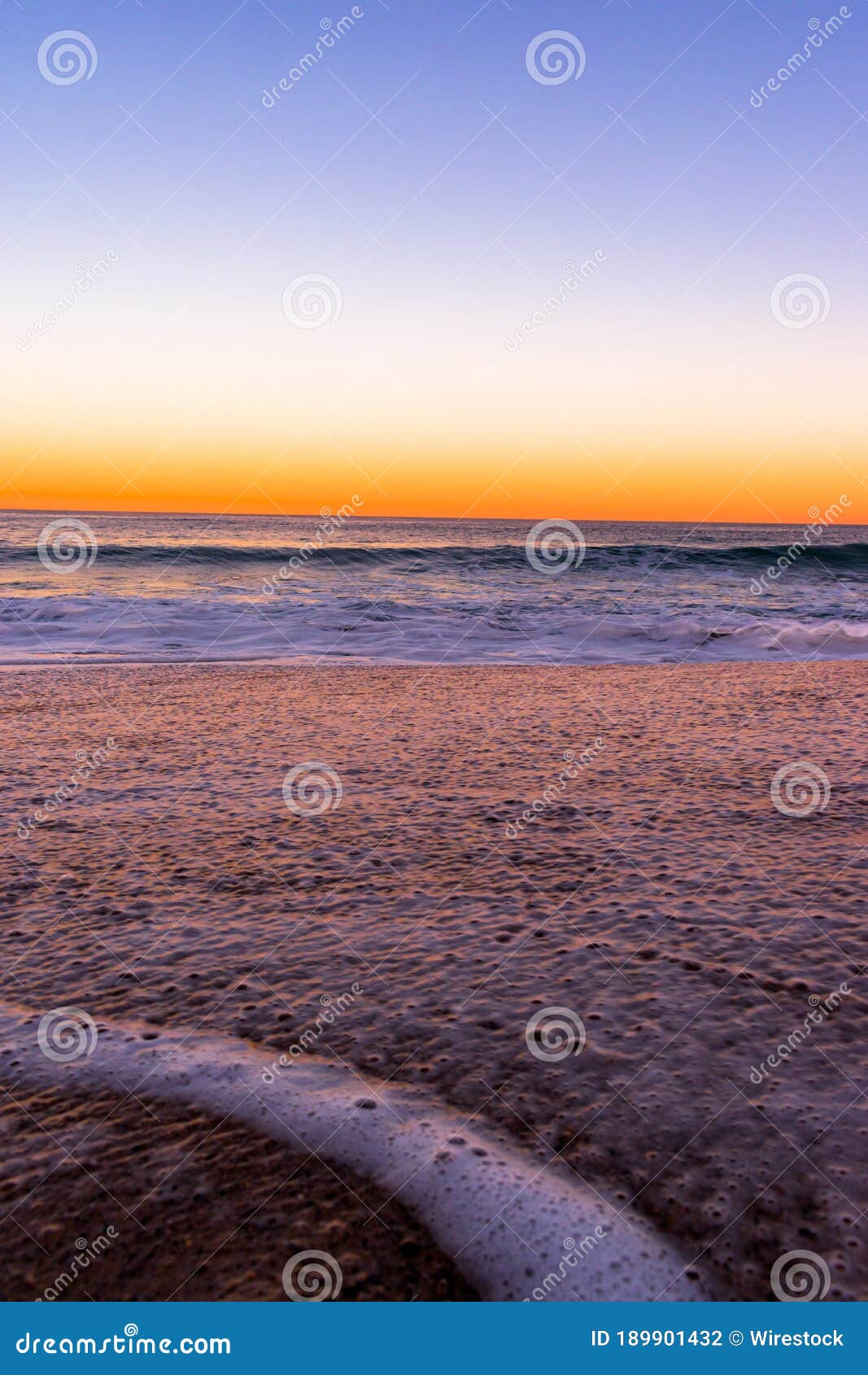 Beautiful Shot of the Tide Rolling in on a Beach at Sunset-perfect for ...